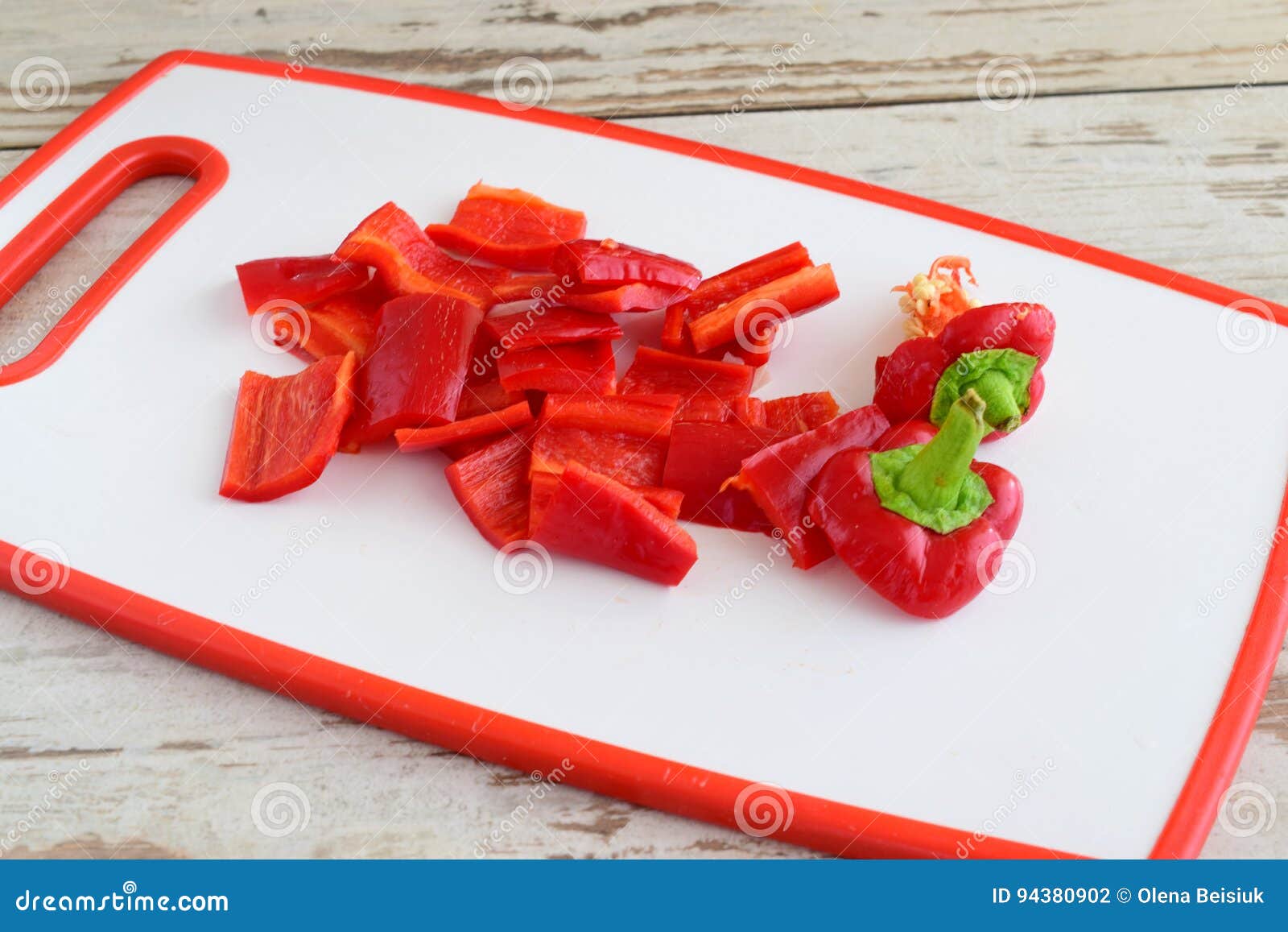 Juicy Red Bell Pepper Cut Up on White Cutting Board. Step by Step ...