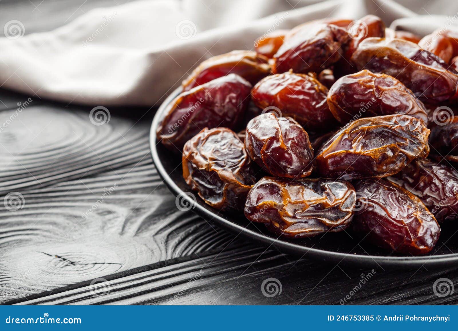 Juicy Royal Dates on a Black Wooden Rustic Background Stock Image ...