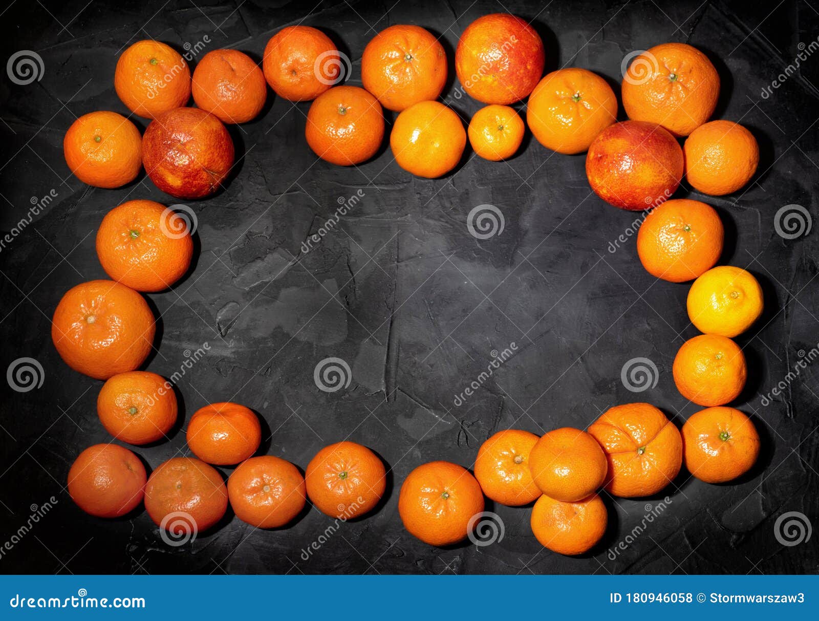 Tangerines On A Dark Blue Background With Orange Slices. Side View ...