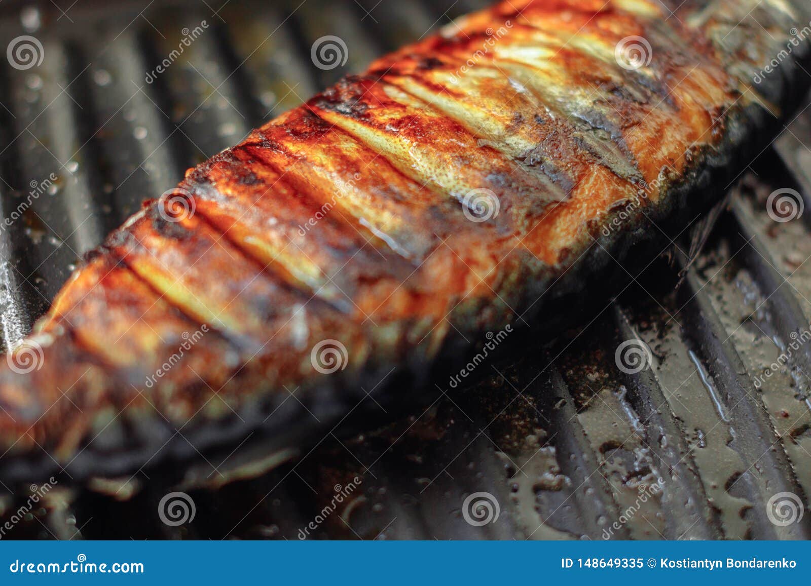 Juicy Tasty fish grilled stock image. Image of cooked - 148649335