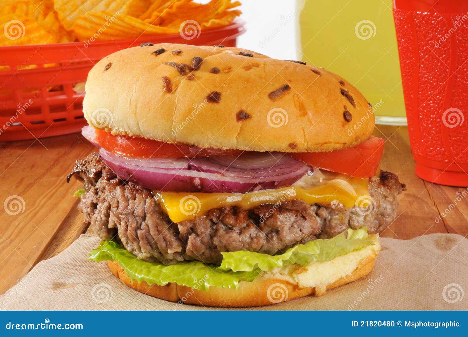 Juicy thick cheeseburger stock photo. Image of onion - 21820480