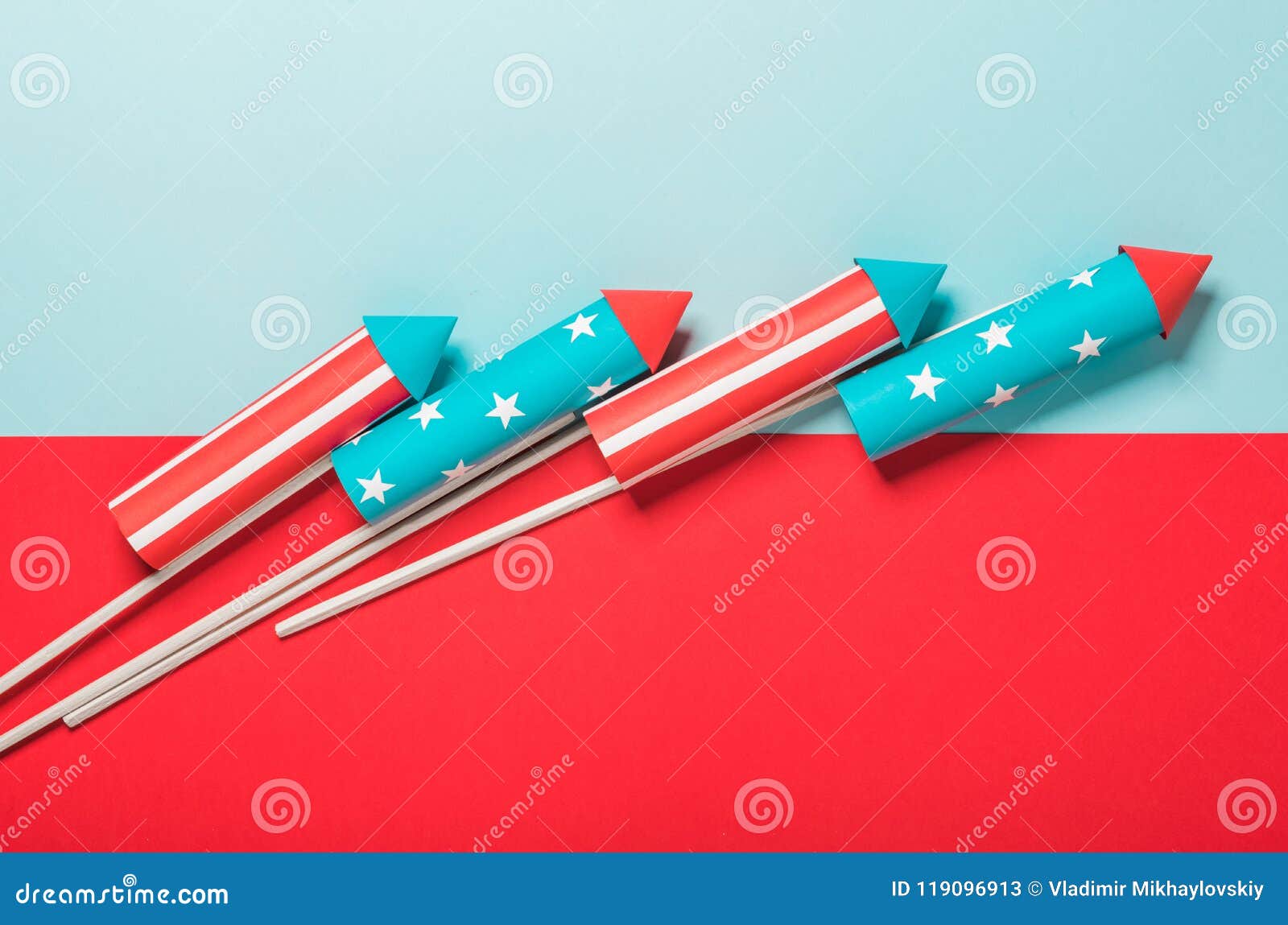 July 4, Rockets for Fireworks on a Blue Red Background with Space for ...
