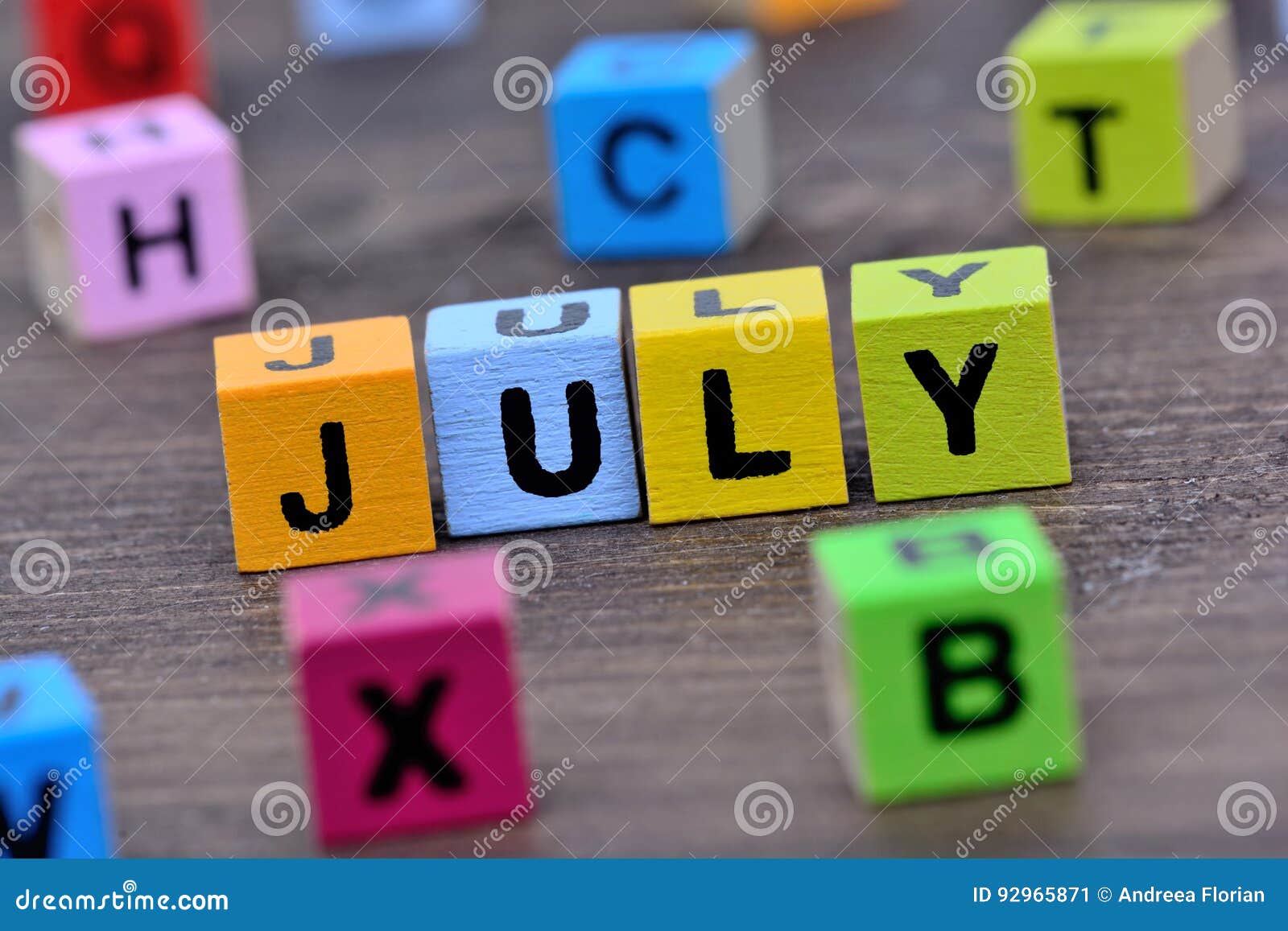 July word on table stock image. Image of monthly, background - 92965871