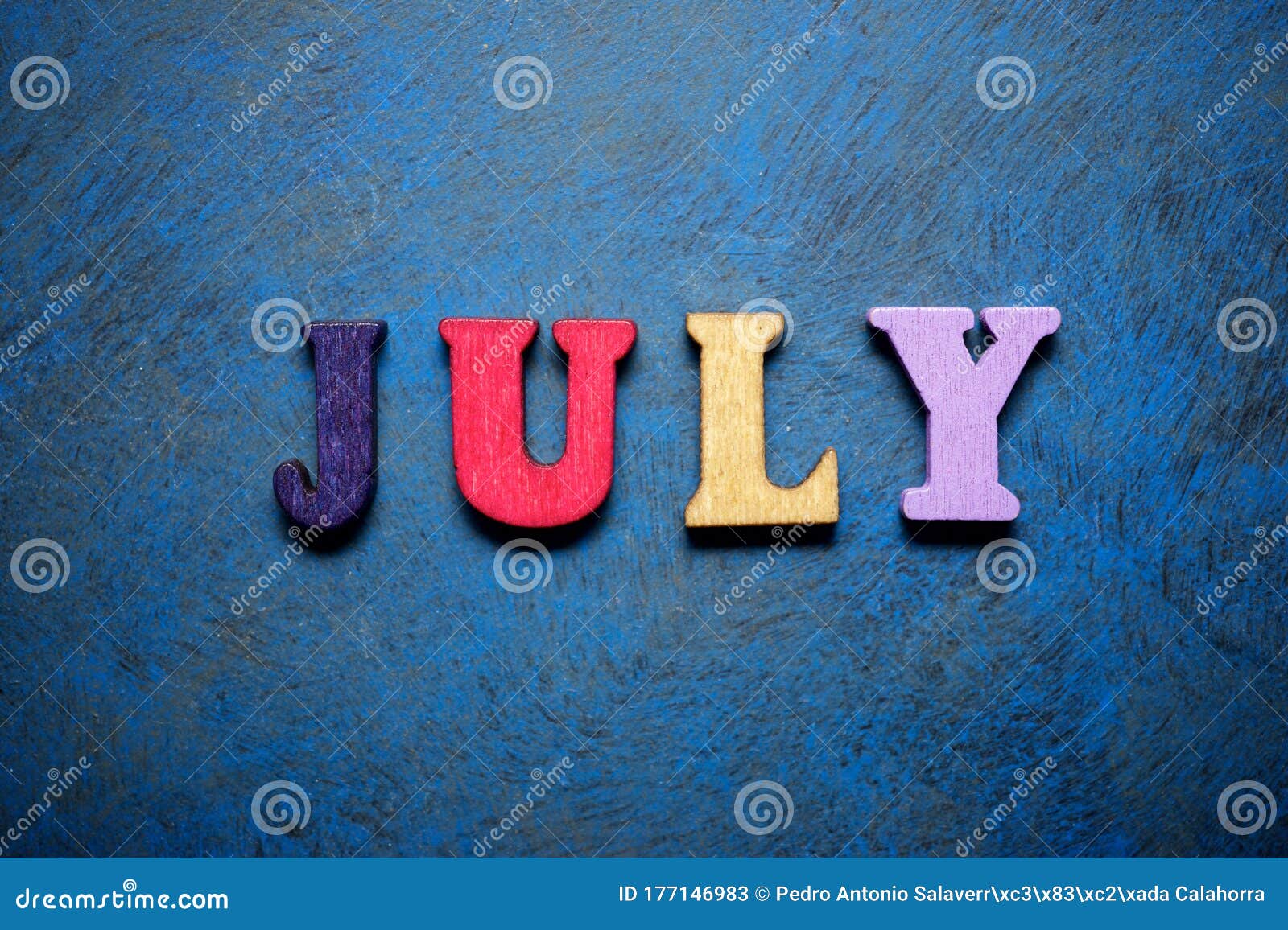 The JULY Word Laid Out With The Inflorescences Of Wild Field Flowers ...