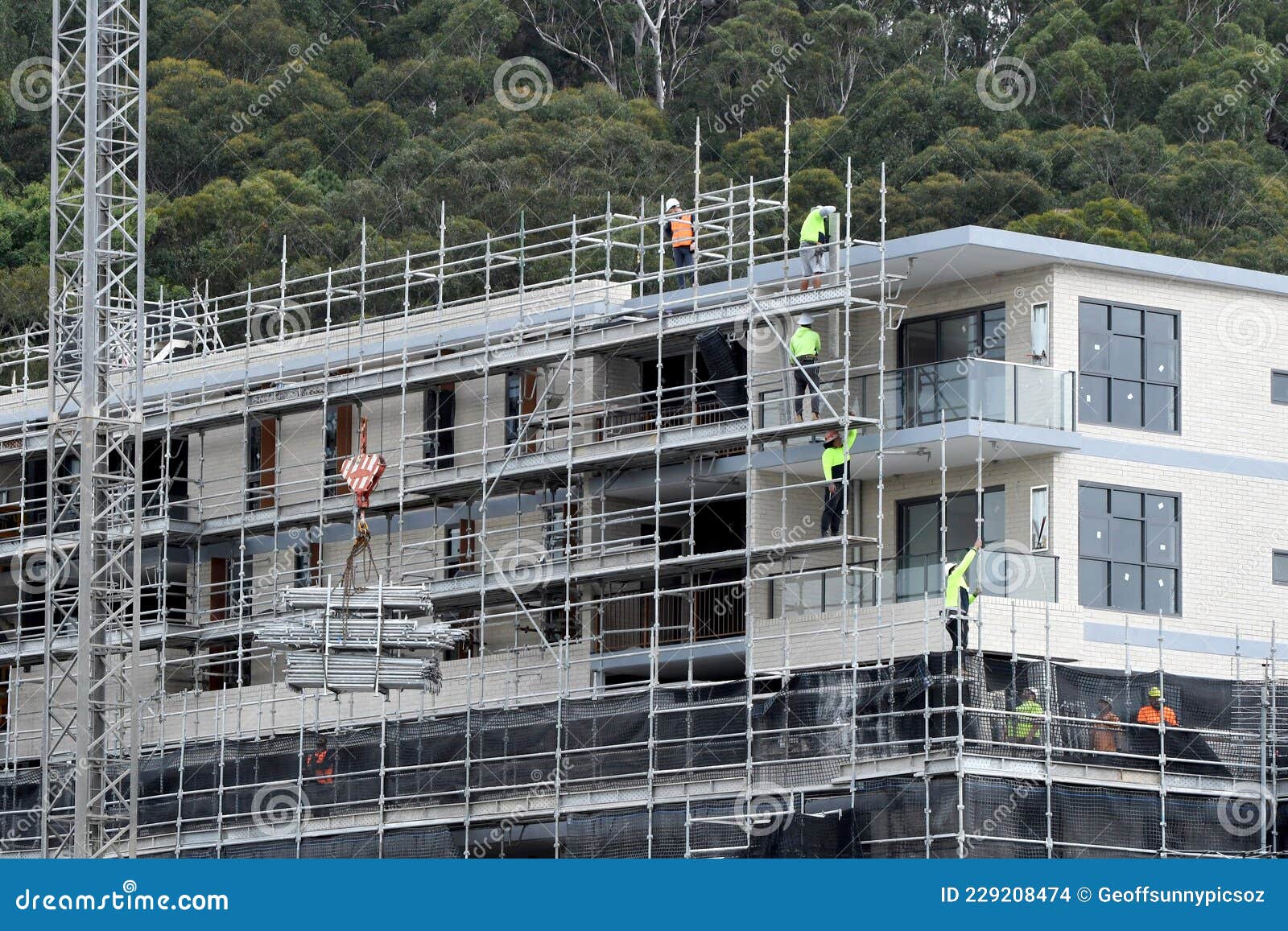 July 15, 2021. Workers Disassembling Scaffolding on Now Complete ...