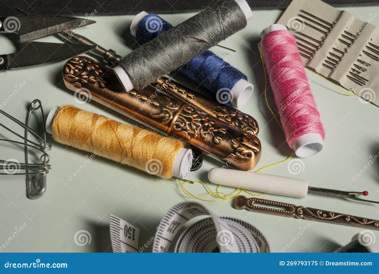 A Jumble of Typical Sewing Objects on a Blue Surface Clara Stock Image ...