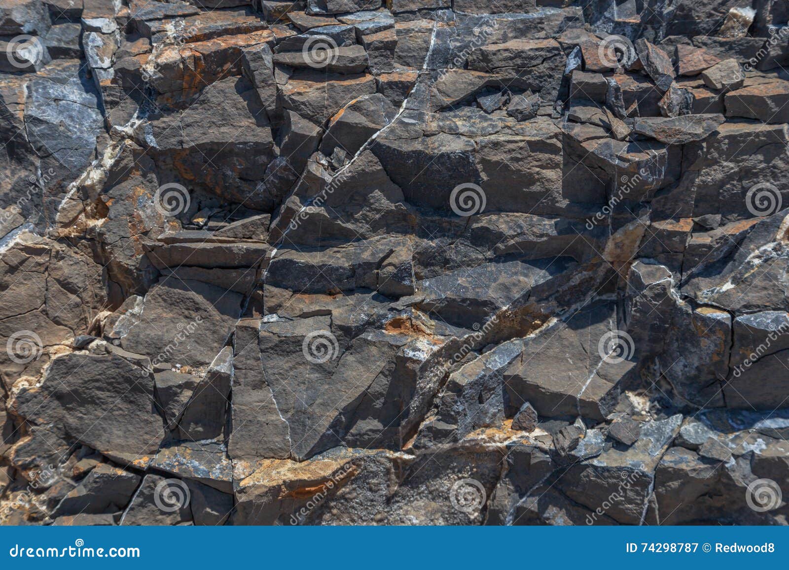 Jumbled Black Rock Wall Background Stock Image - Image of color ...