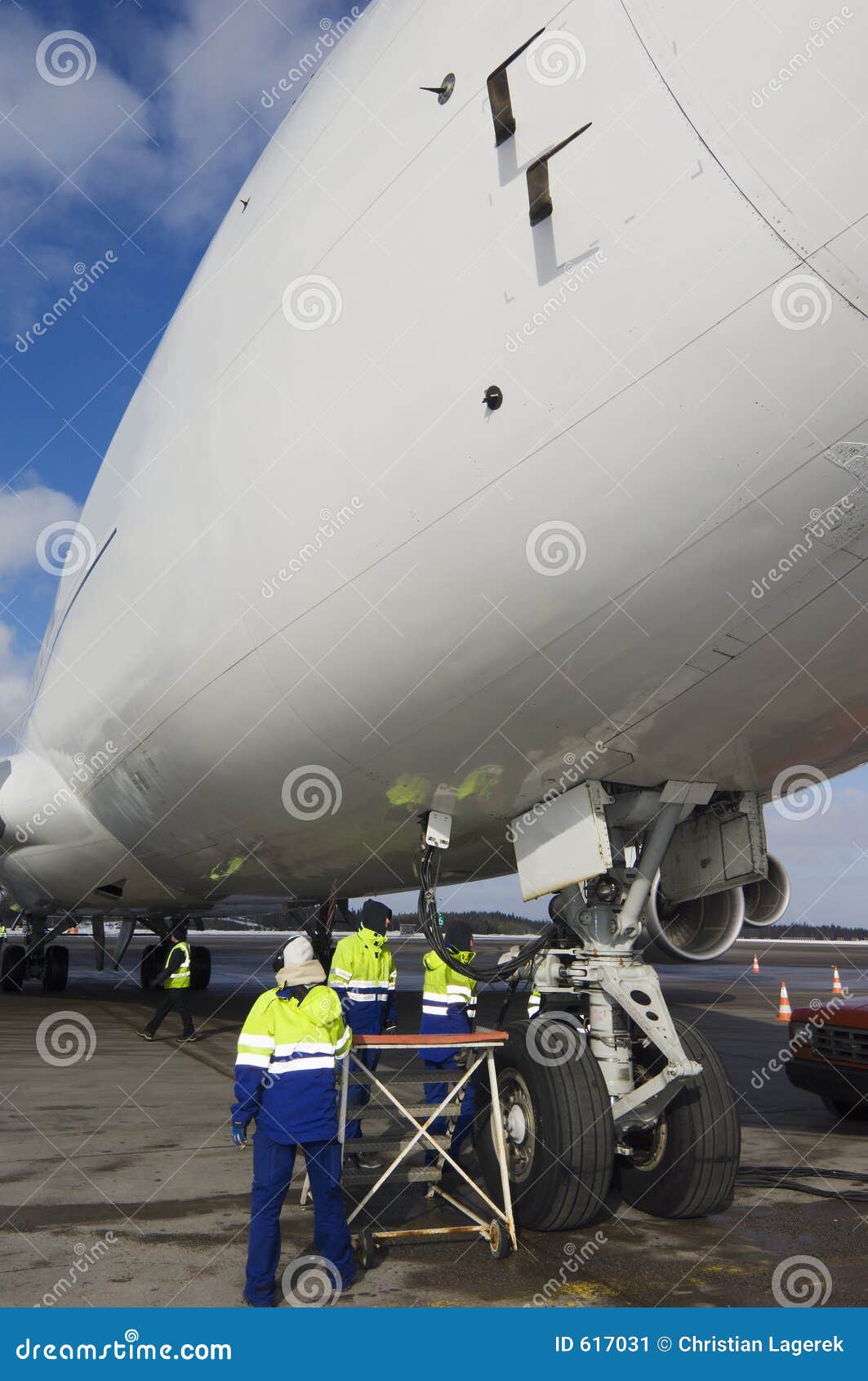 Jumbo-jet being serviced stock image. Image of maintenance - 617031