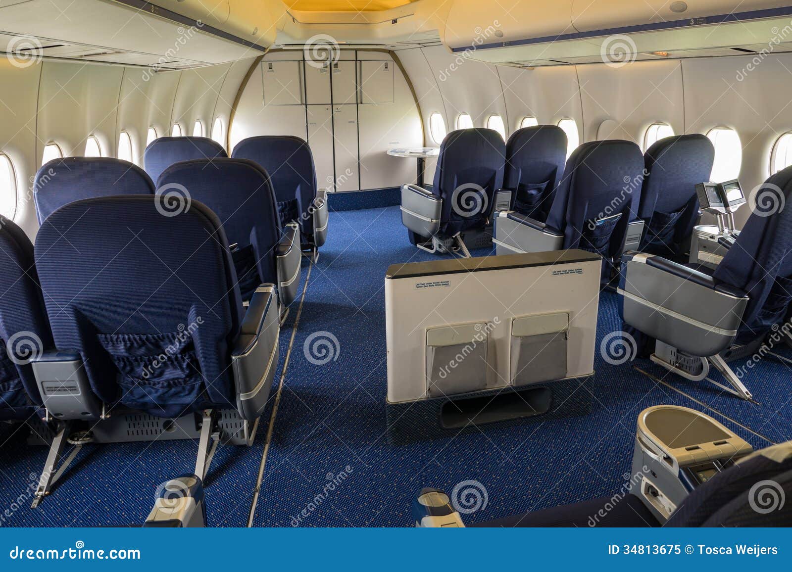 Jumbo jet business class stock image. Image of cabin - 34813675