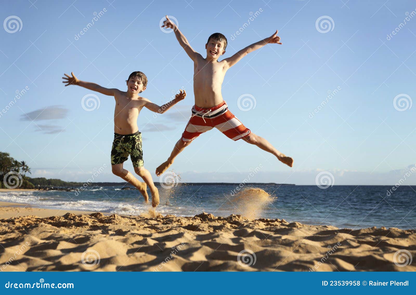 Jump at the beach stock photo. Image of youth, beach - 23539958