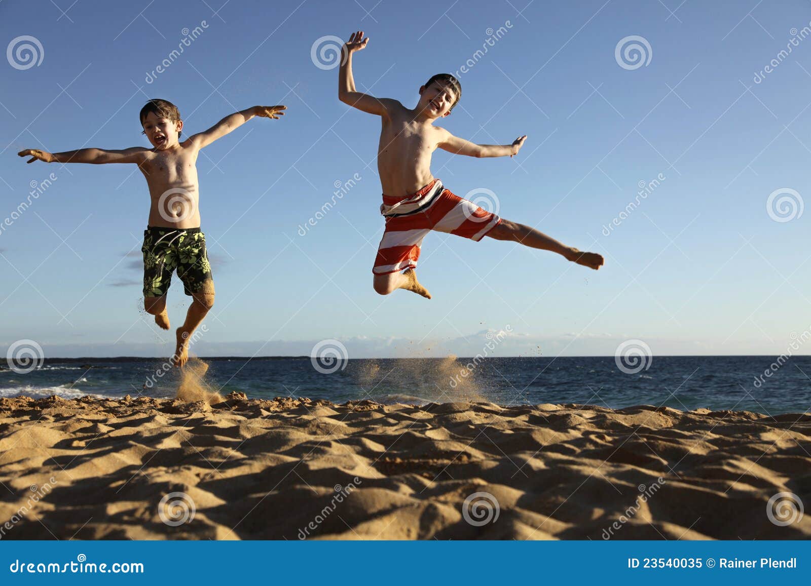 Jump at the beach stock image. Image of young, male, beach - 23540035