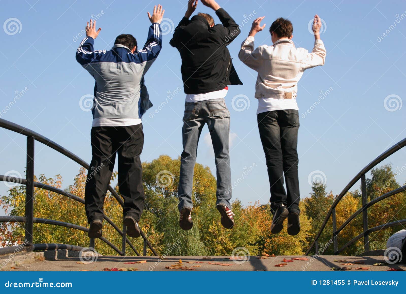 Jump boys stock image. Image of leaves, back, body, outdoors - 1281455