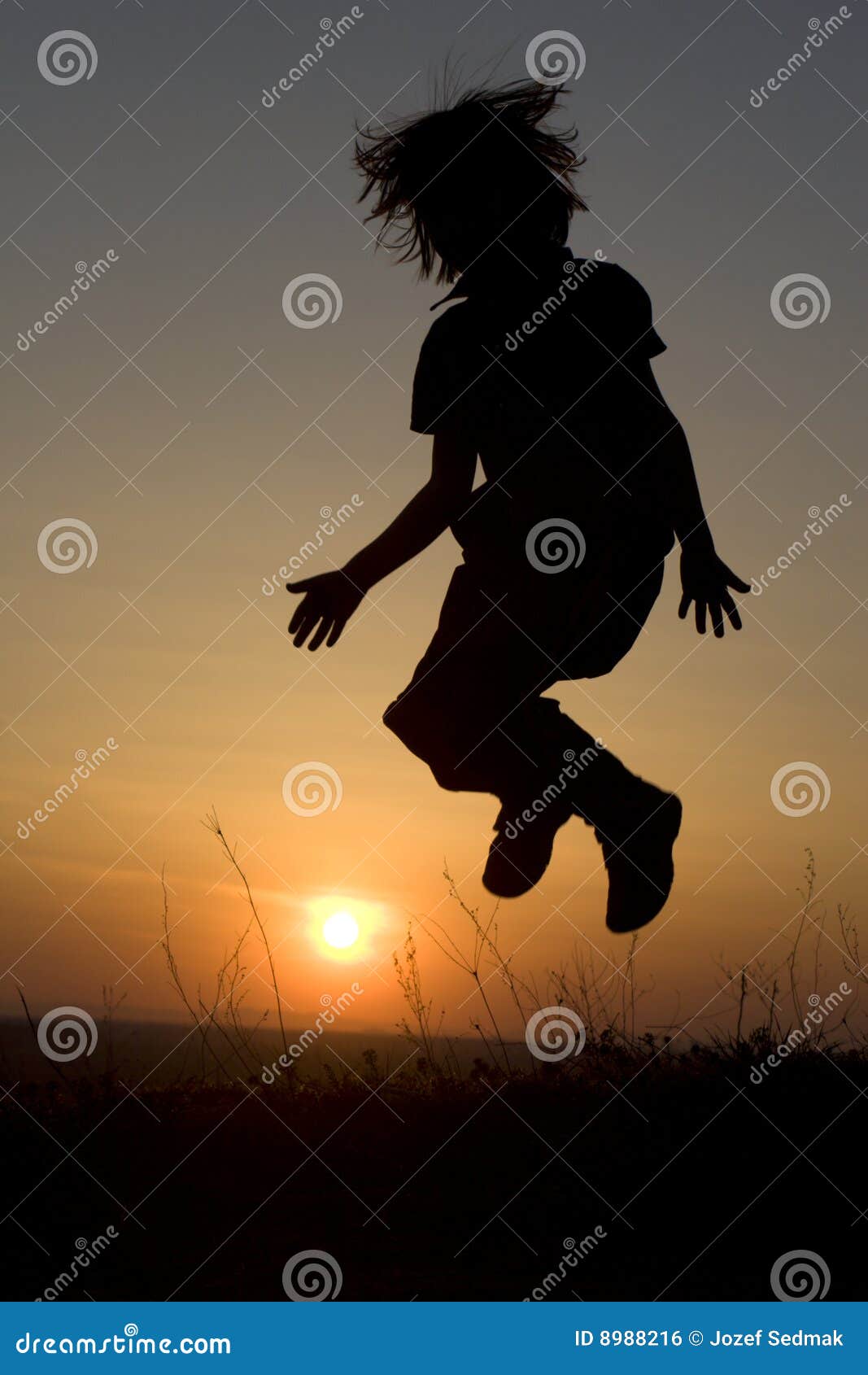 Jump of Child in the Sunset Stock Photo - Image of happy, child: 8988216