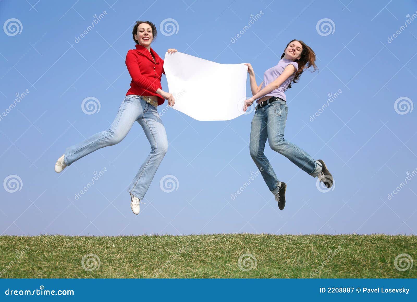 Jump girls with paper stock image. Image of girl, nature - 2208887