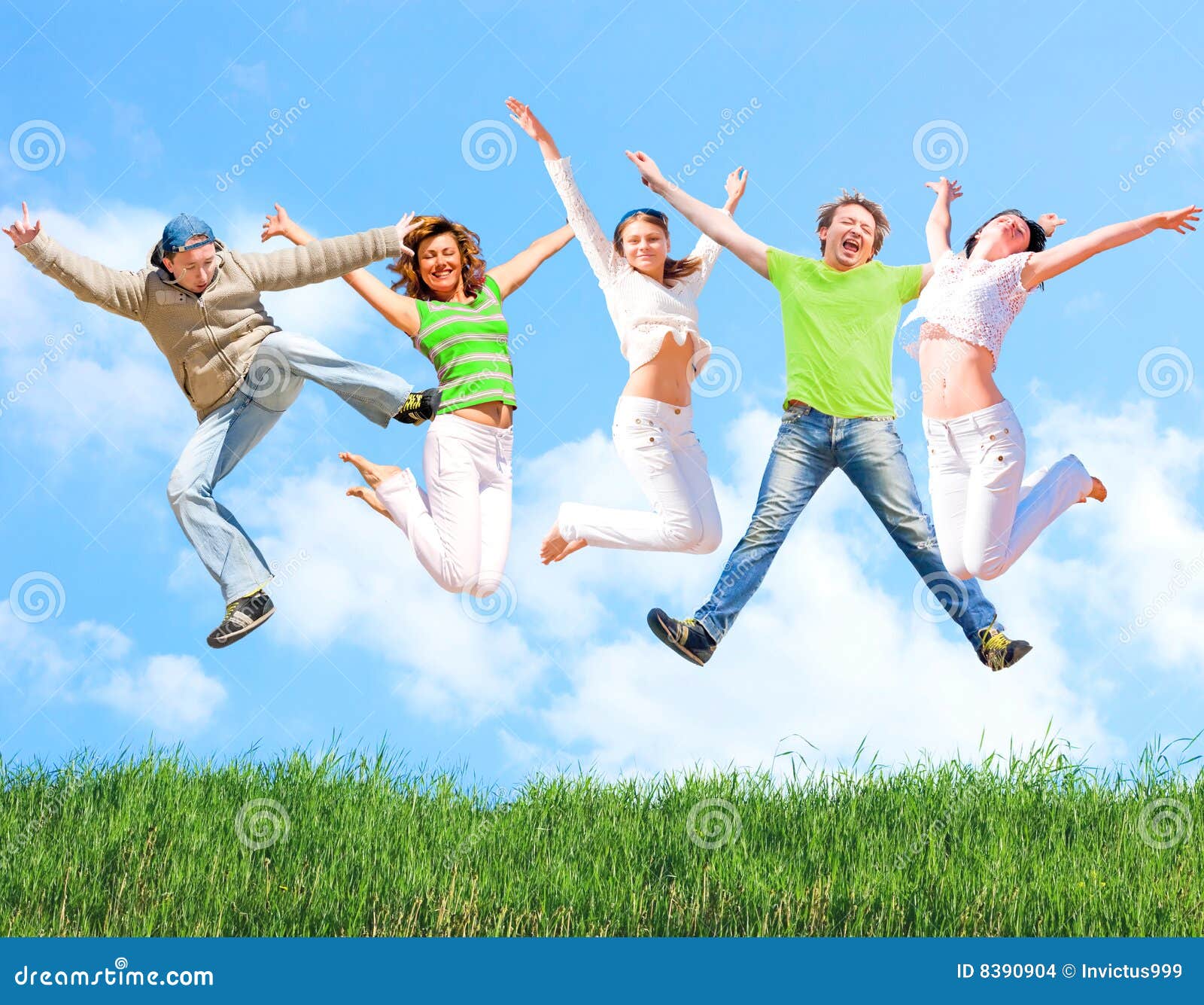 Jump of a group stock photo. Image of beach, grass, outdoor - 8390904