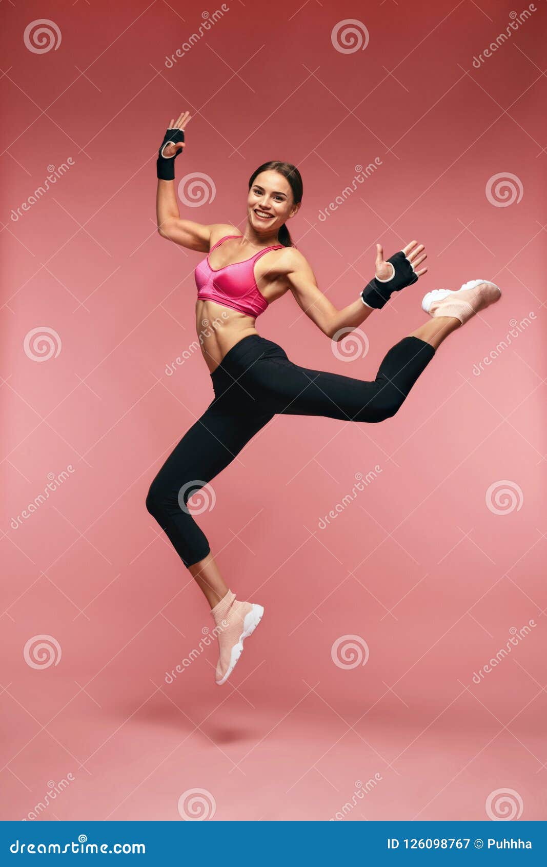 Jump Motion. Smiling Sports Woman Jumping in Sportswear Stock Image ... Jump Motion. Smiling Sports Woman Jumping in Sportswear Stock Image ...