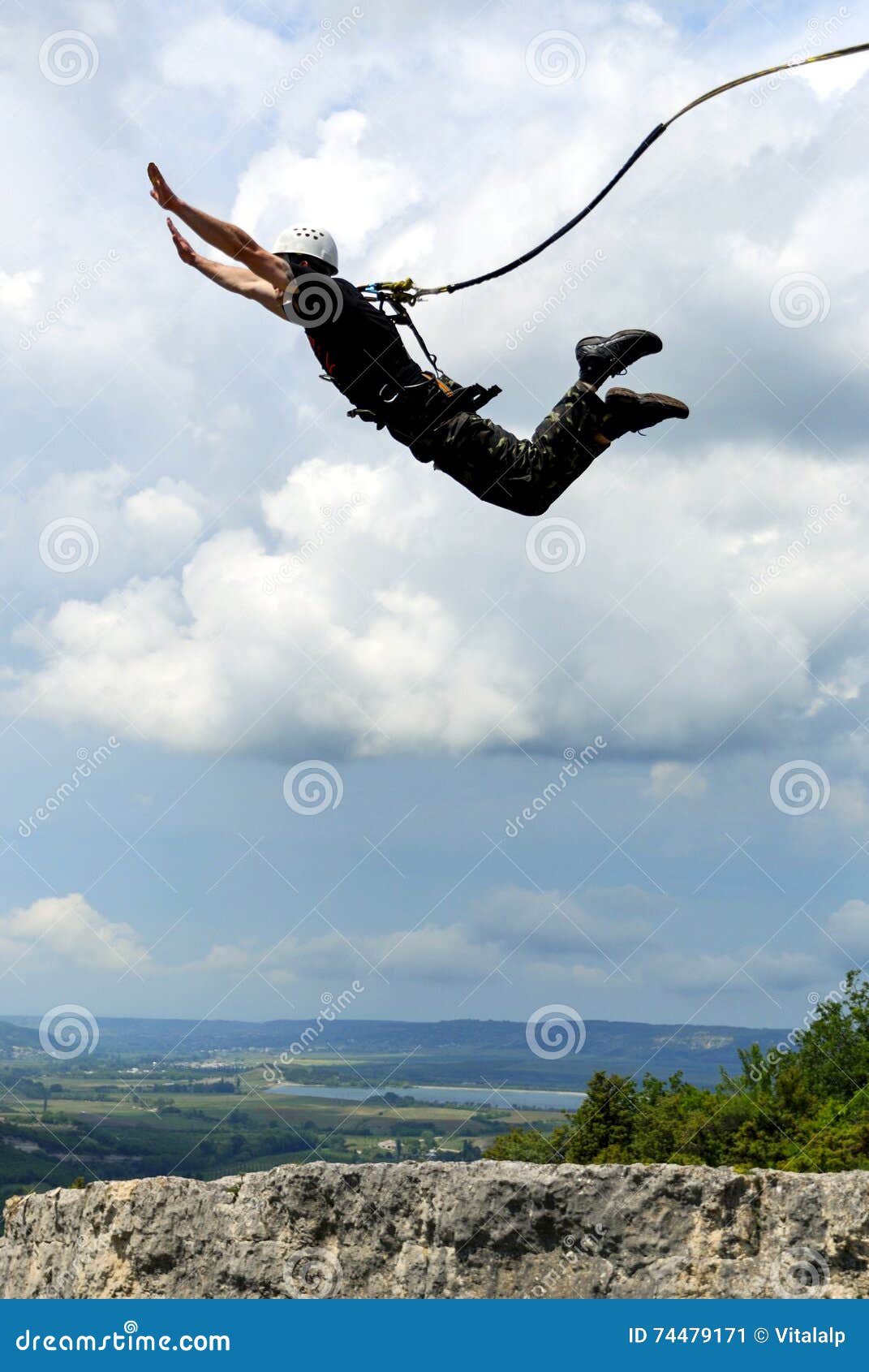 Jump off the cliff. stock image. Image of ropejumping - 74479171