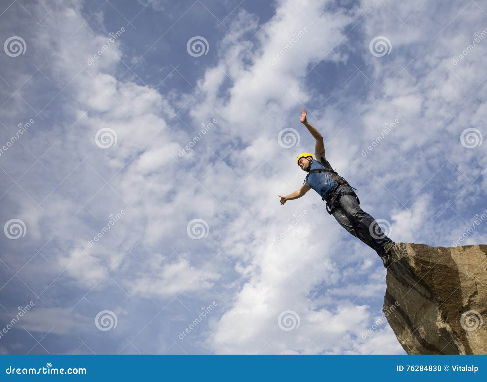 Jump off a cliff. stock photo. Image of mountain, confidence - 76284830