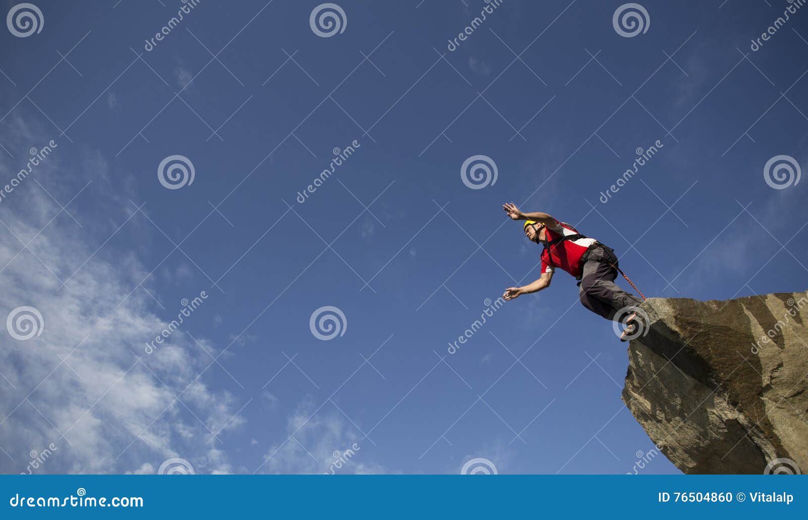 Jump off a cliff. stock photo. Image of moving, high - 76504860