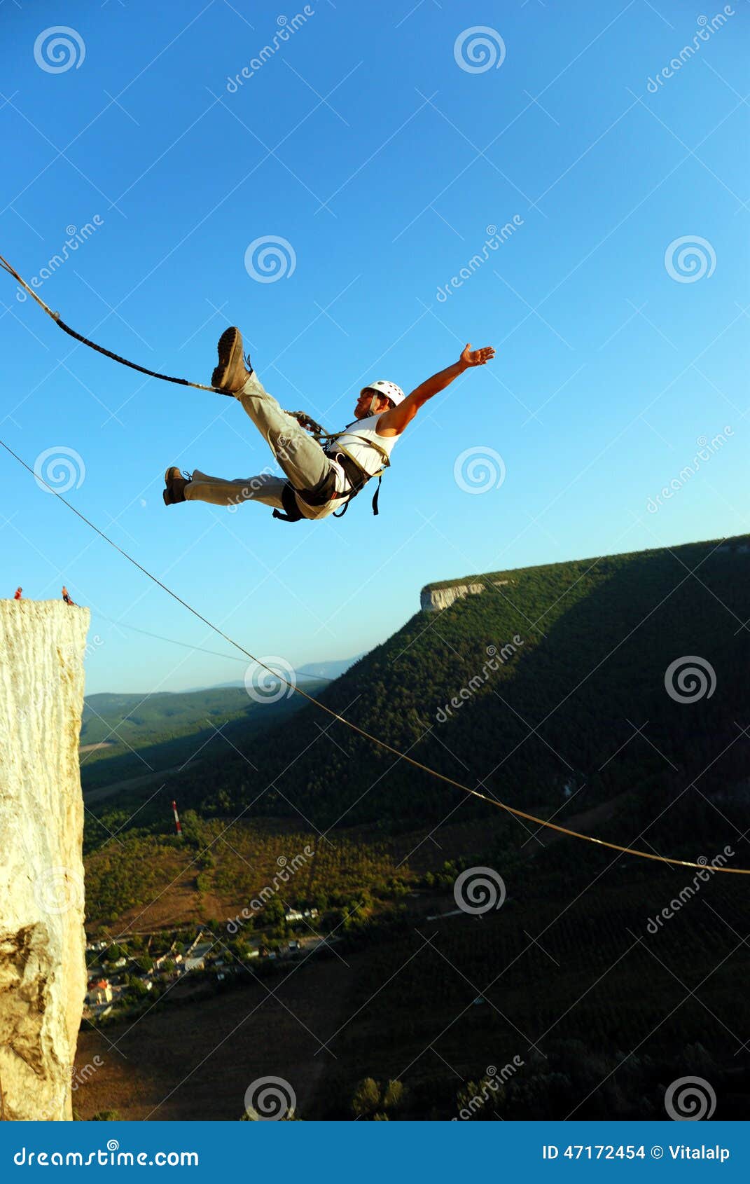 Jump Off a Cliff with a Rope.Bungee Jumping Stock Photo - Image of ...