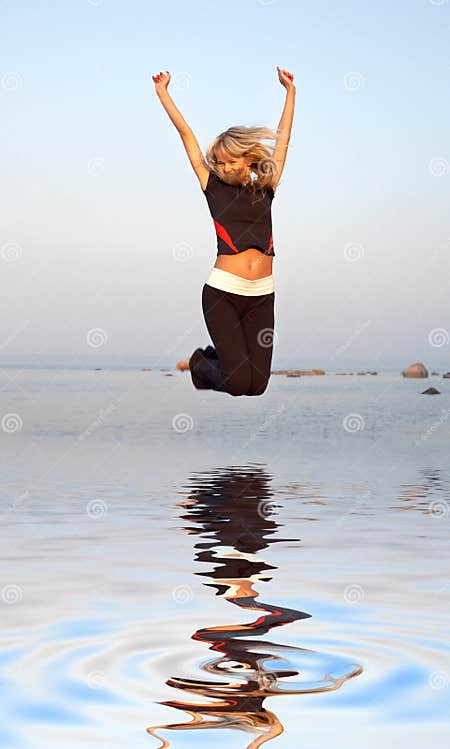 Jump over water stock image. Image of happiness, freedom - 4906053