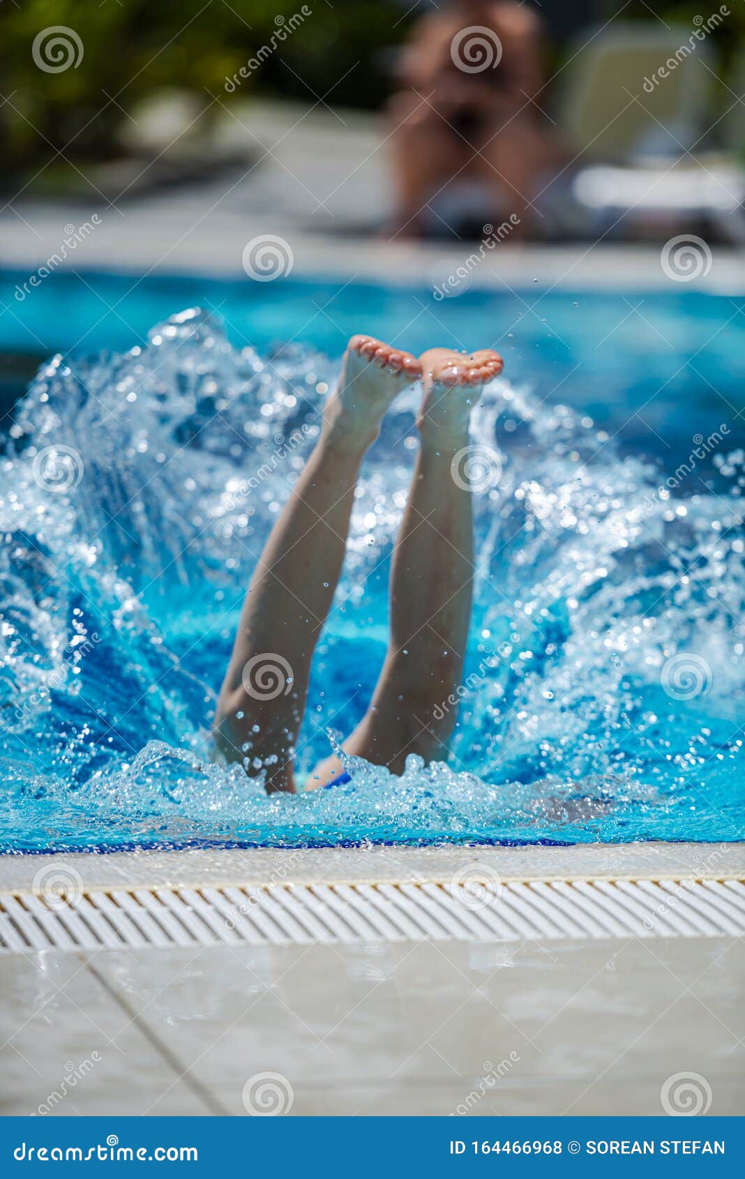 Jump in water in the pool stock photo. Image of ocean - 164466968