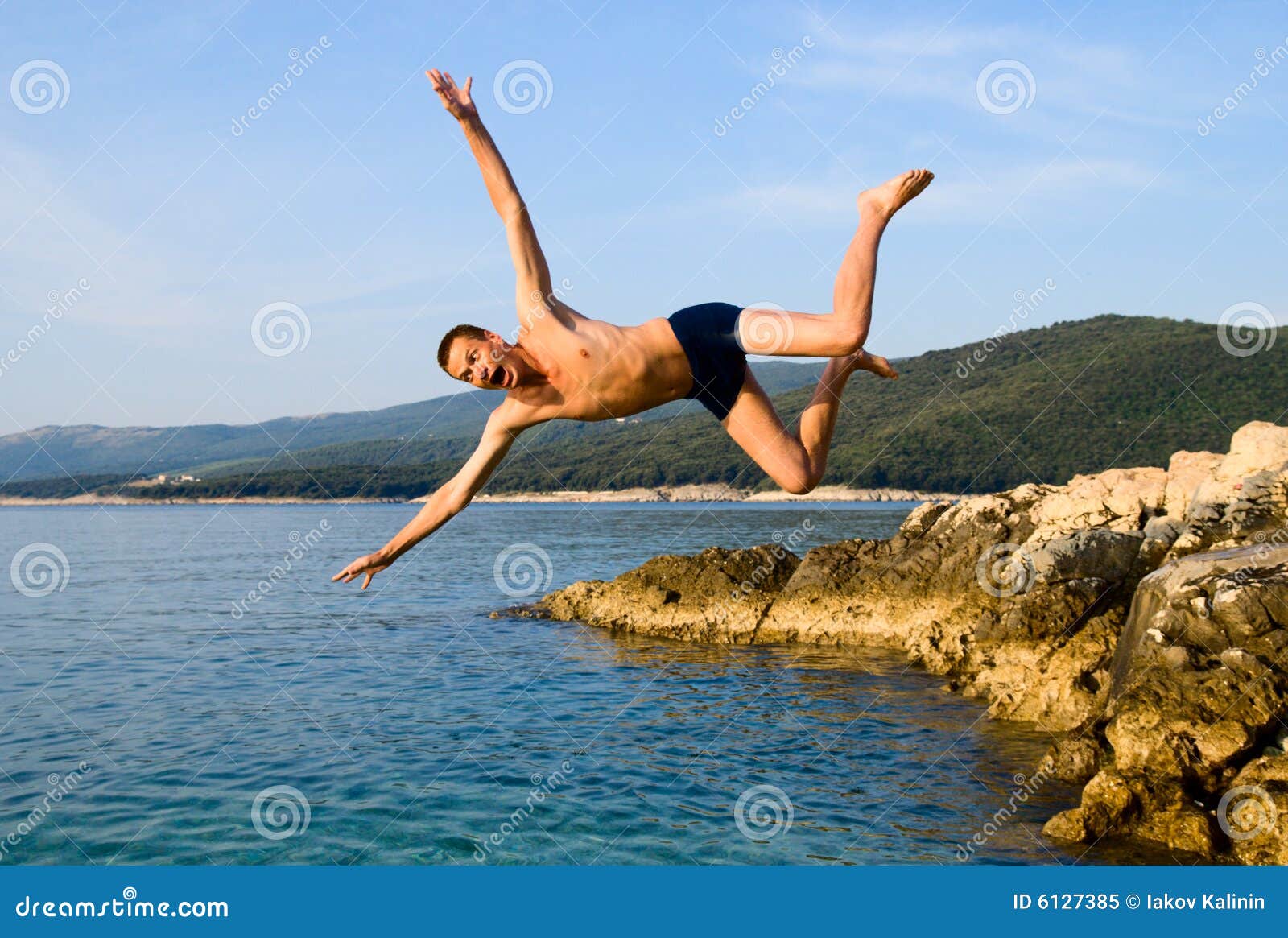 Jump from rock stock image. Image of health, fitness, cool - 6127385