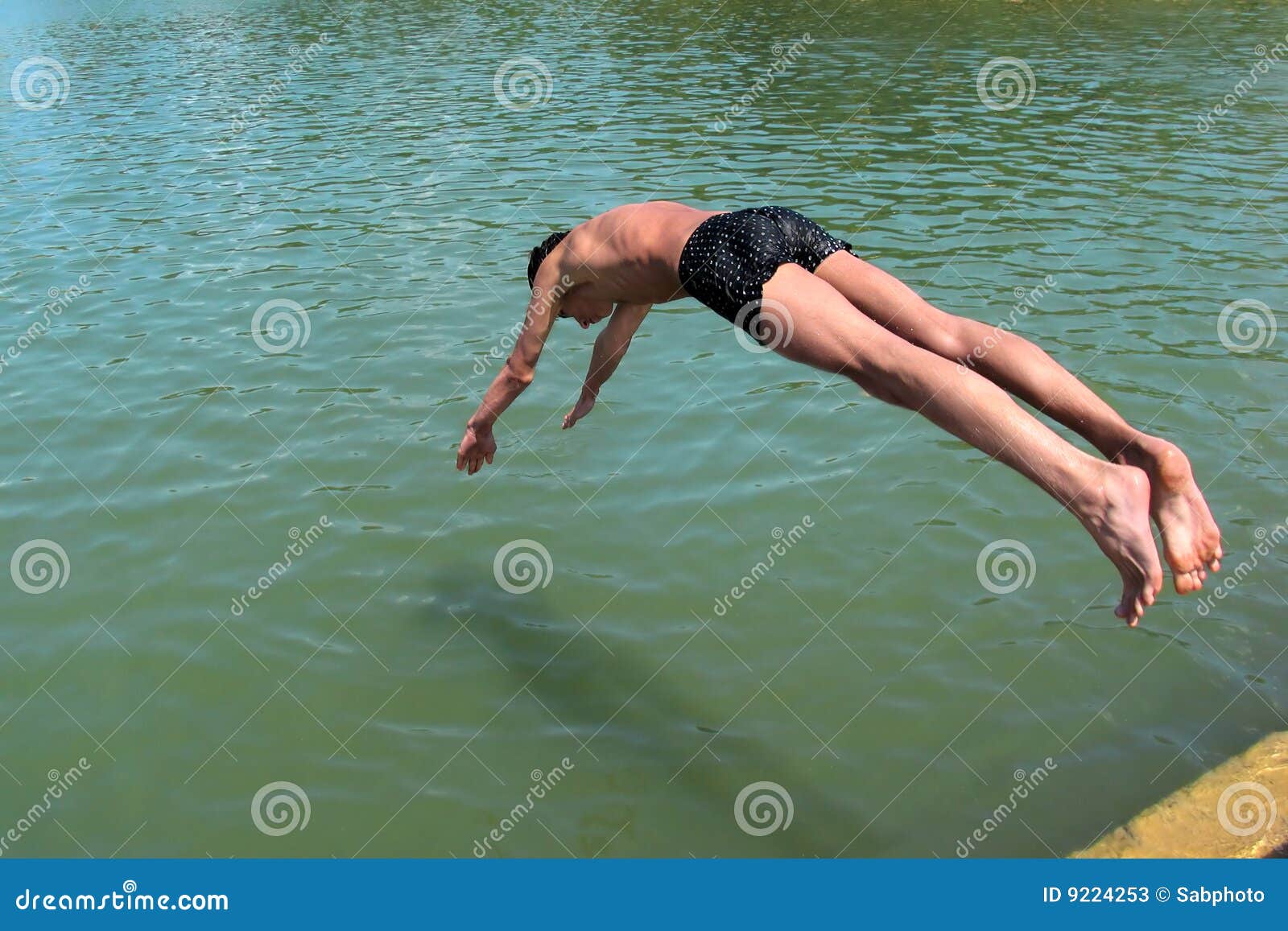 Jump in the sea stock image. Image of expression, effort - 9224253