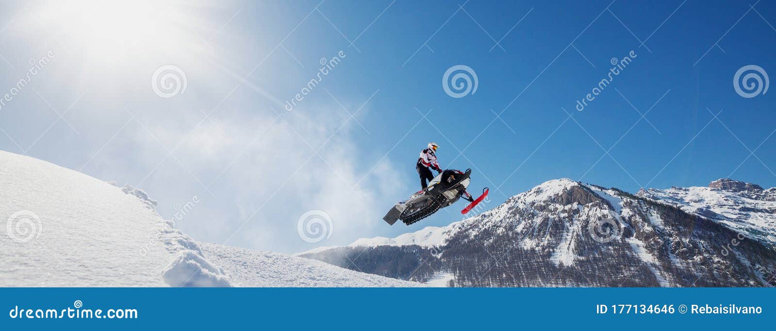 Jump with snowmobile stock photo. Image of sled, clear - 177134646