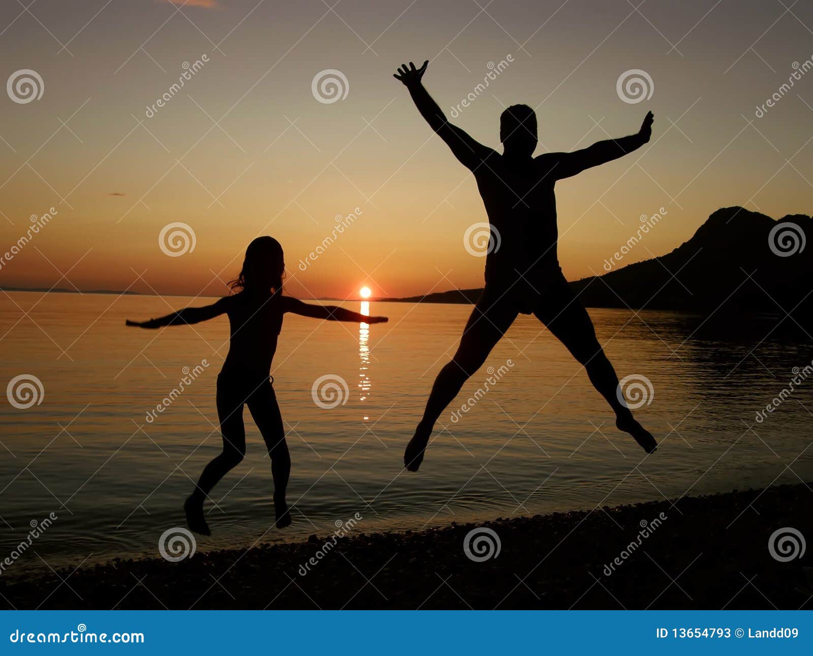 Jump in sunset stock image. Image of beach, cool, carefree - 13654793