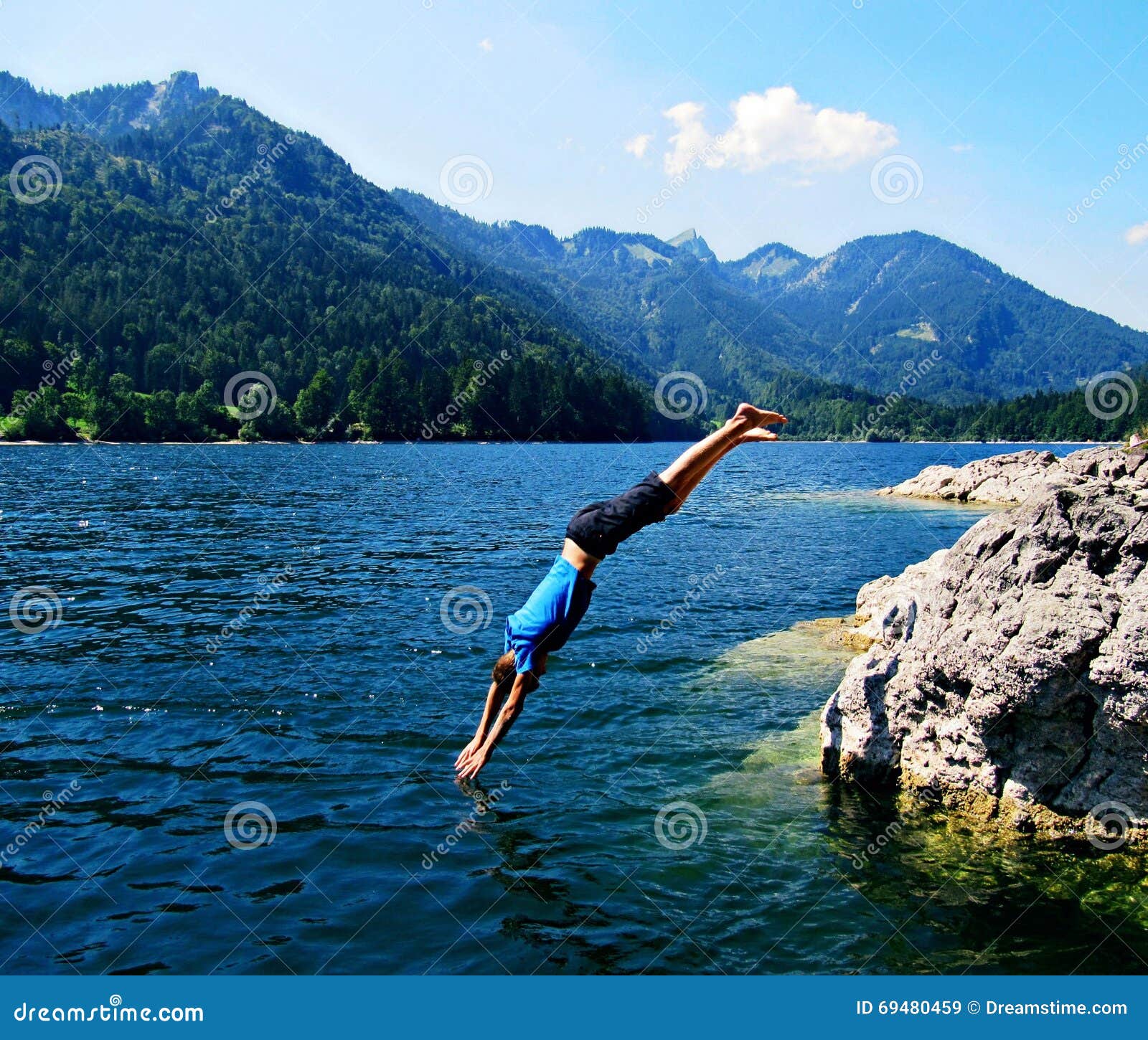 Jump in the water editorial stock image. Image of mountain - 69480459