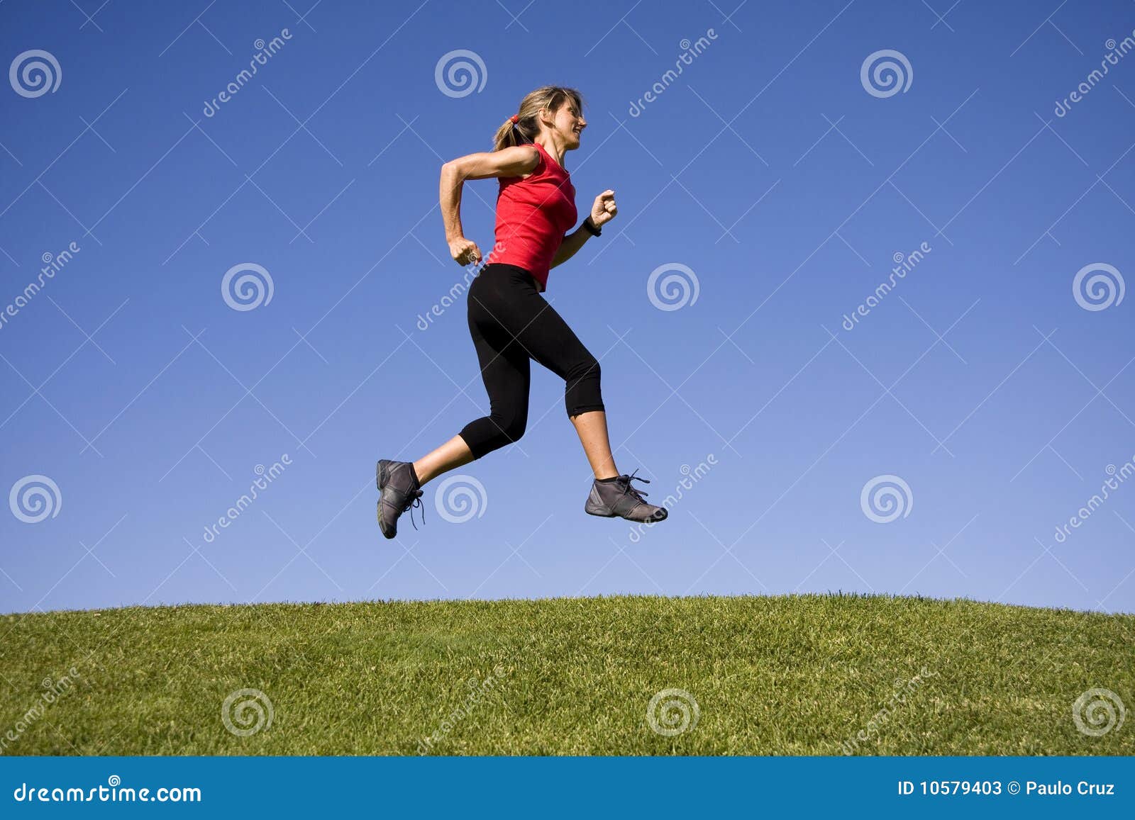 Jumping stock image. Image of fitness, grass, athletic - 10579403