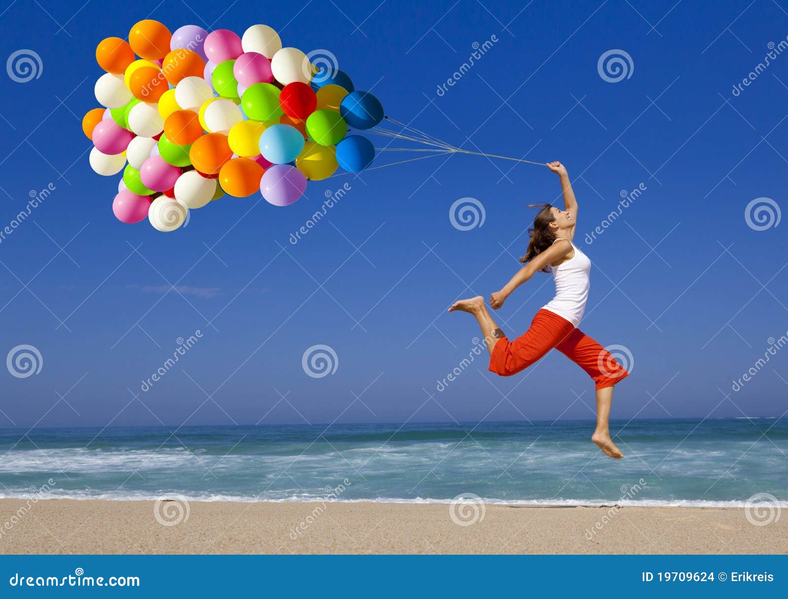 Jumping with balloons stock photo. Image of athletic - 19709624