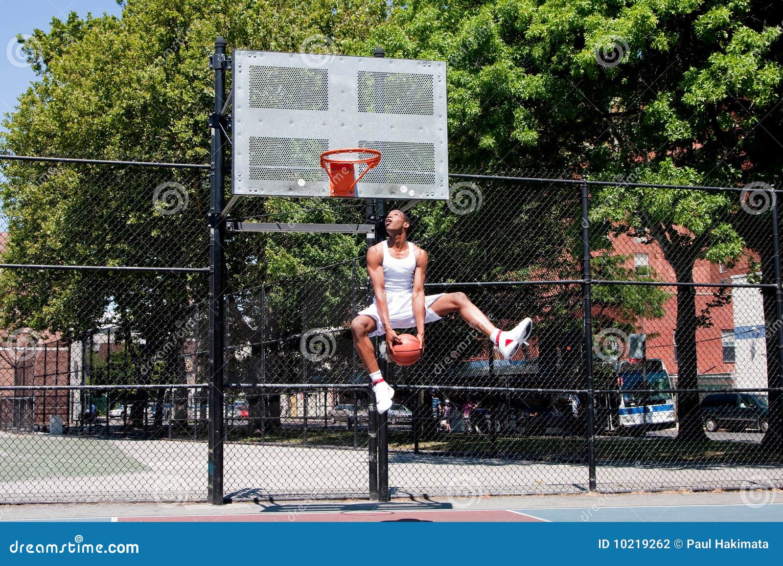 Jumping basketball player stock photo. Image of play - 10219262