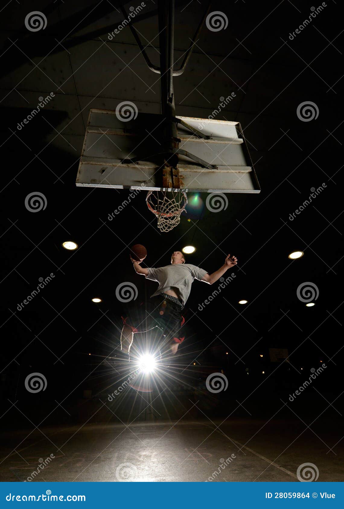 Jumping basketball player stock photo. Image of fitness - 28059864