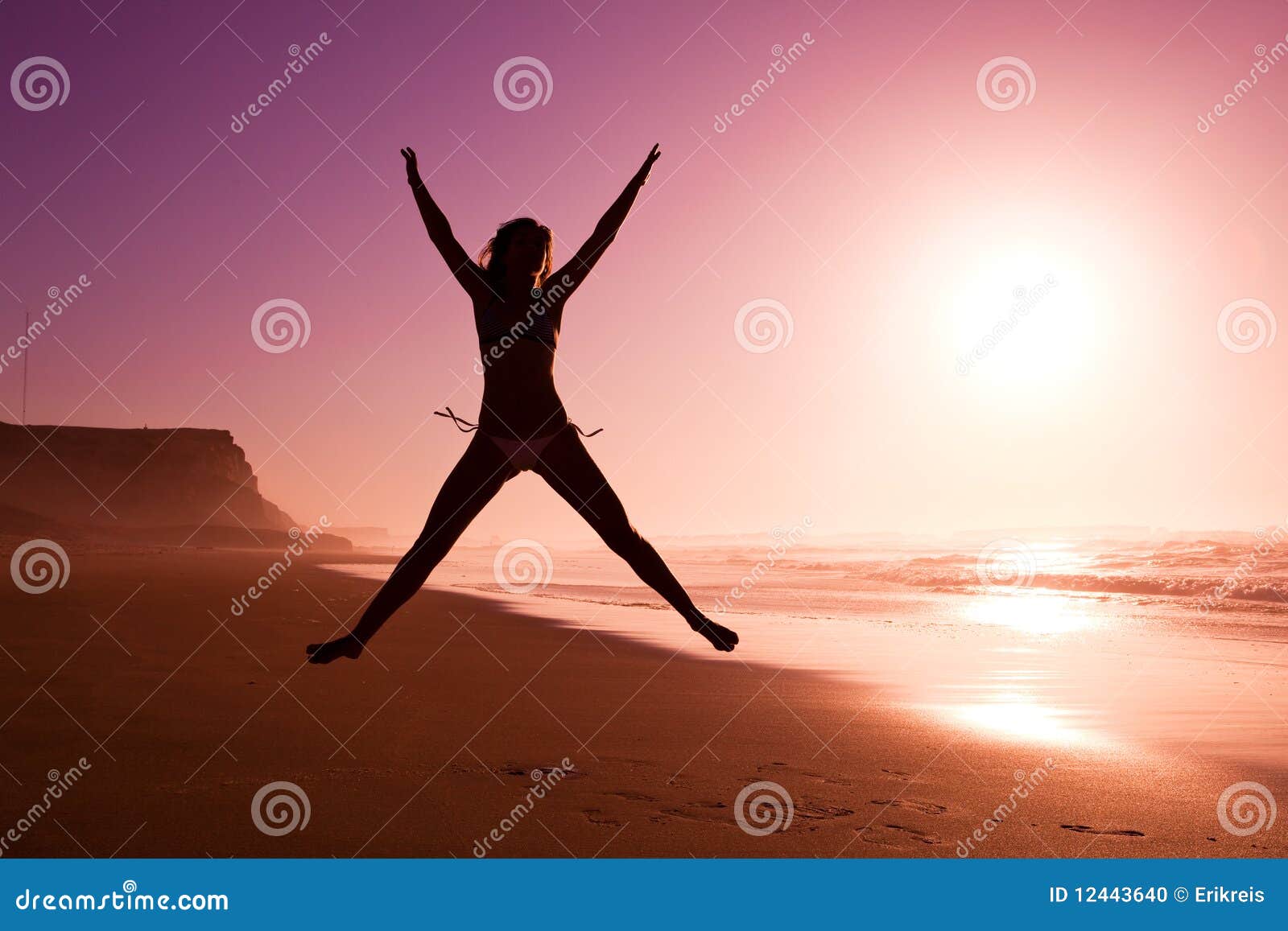 Jumping on the beach stock photo. Image of girl, health - 12443640