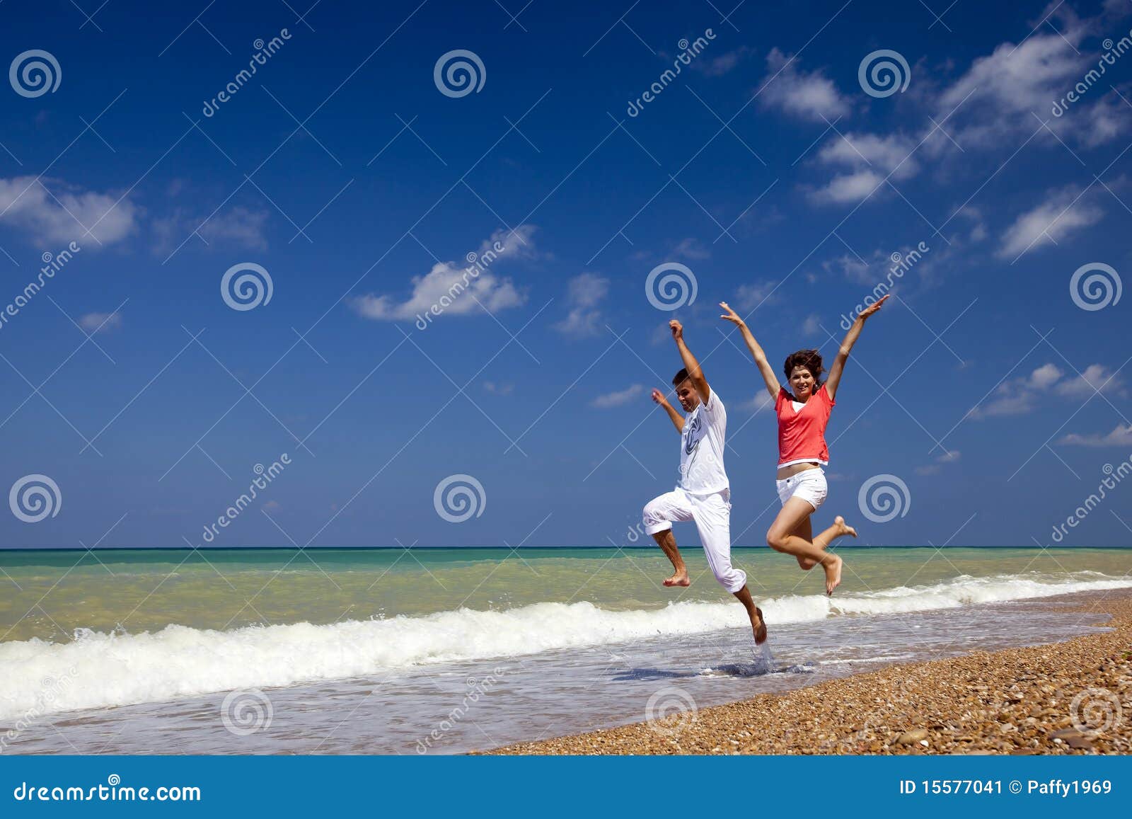 Jumping on the beach stock image. Image of beauty, jump - 15577041