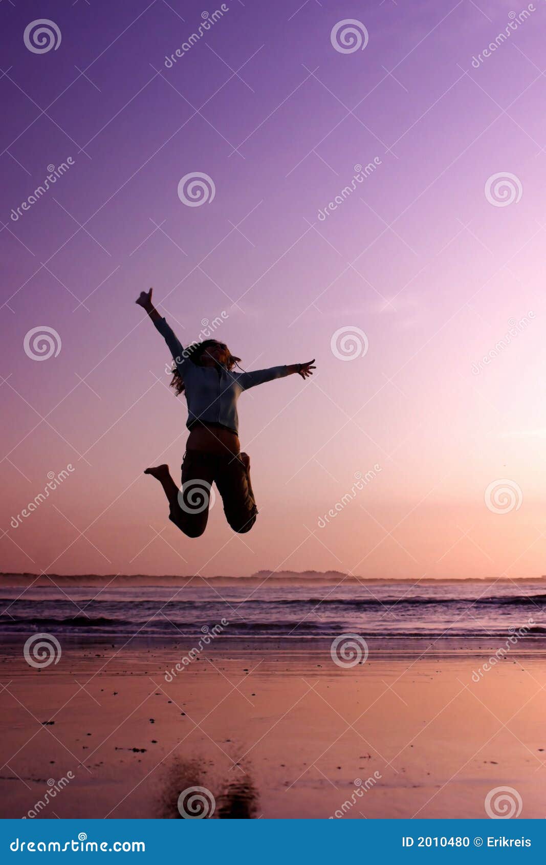 Jumping on the beach stock photo. Image of colour, freedom - 2010480