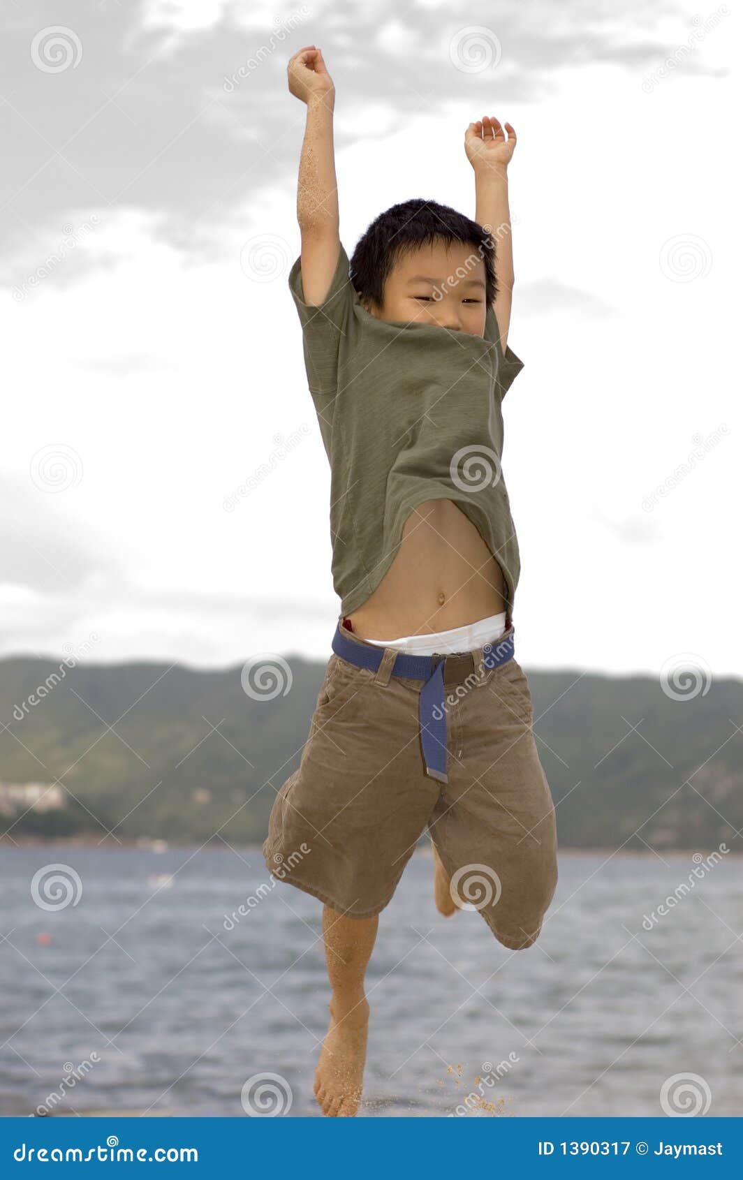 Jumping boy stock image. Image of happy, girl, male, vacation - 1390317