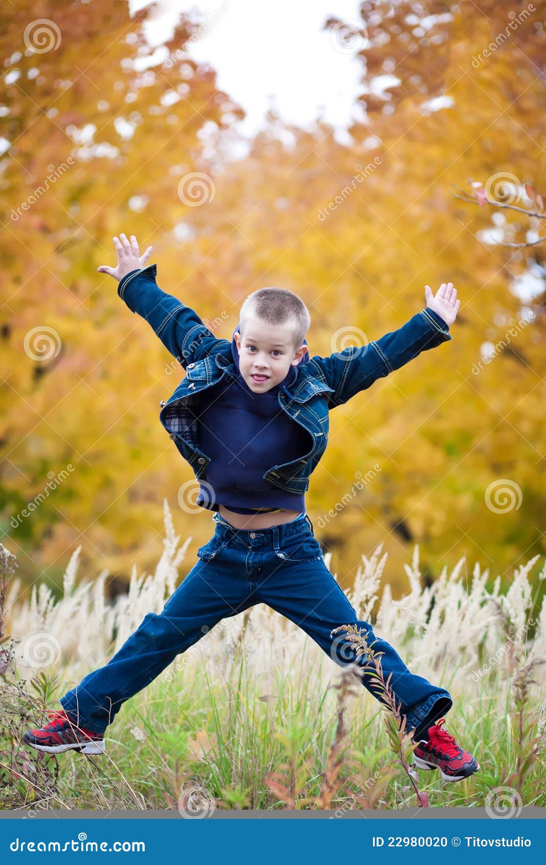 Jumping boy stock photo. Image of casual, cheerful, stripes - 22980020