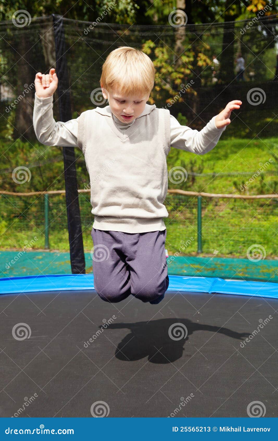 Jumping boy stock image. Image of blond, playground, summer - 25565213