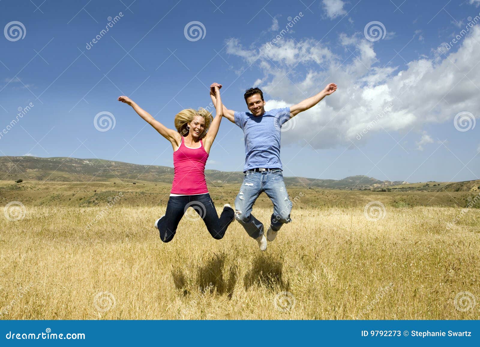 Jumping couple stock image. Image of spring, clouds, romantic - 9792273