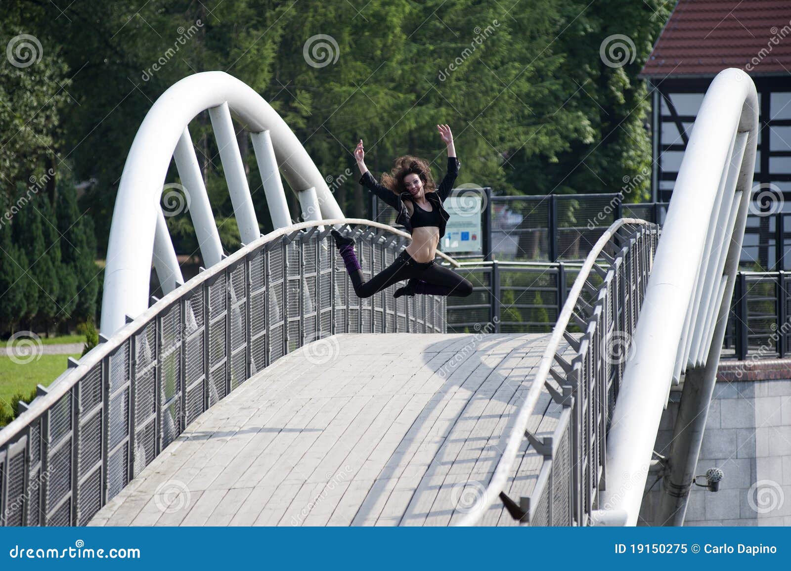 Jumping dancer on bridge stock image. Image of exercise - 19150275