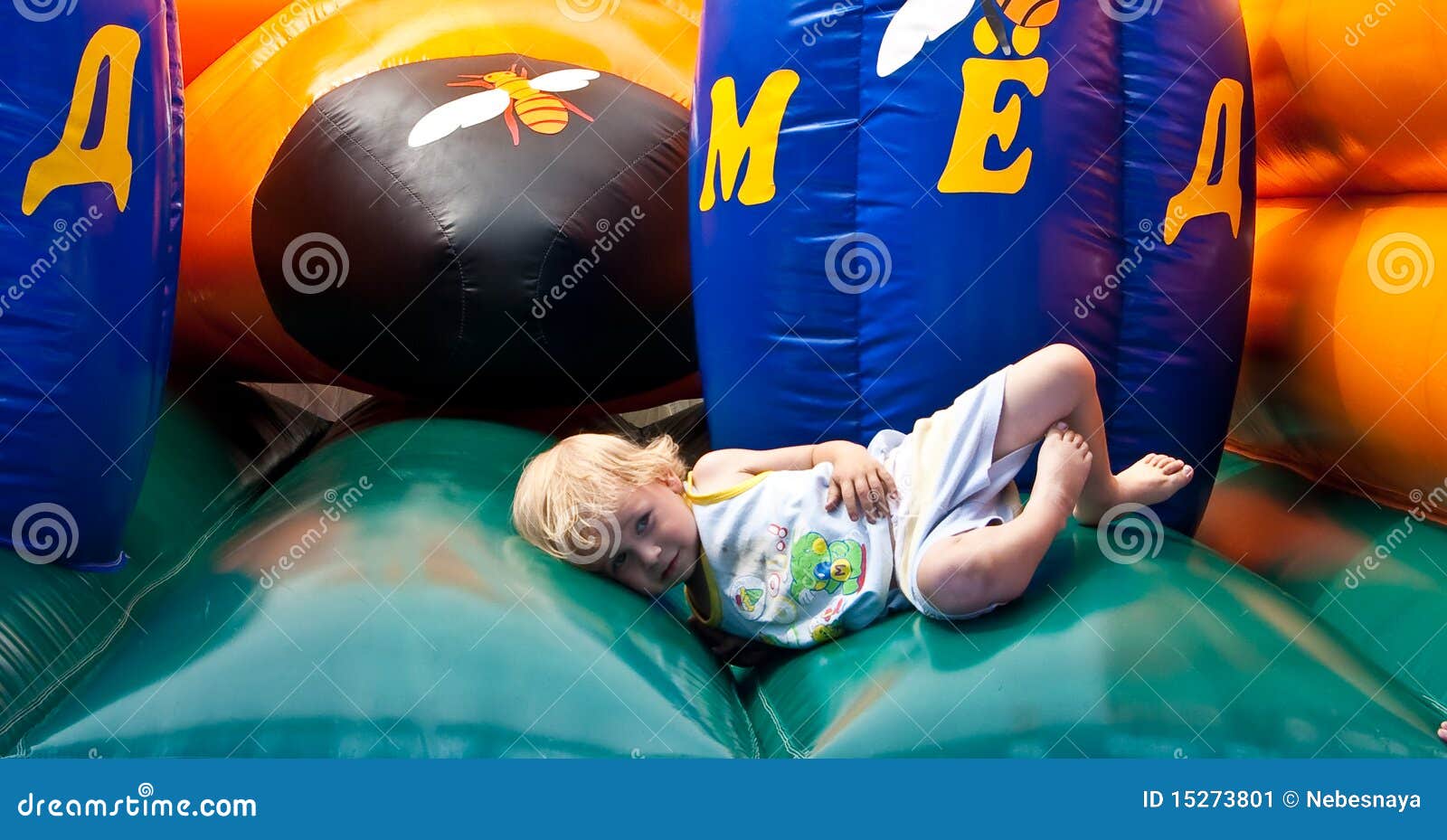 Jumping and Falling on Bouncy Castle Stock Image - Image of blond ...