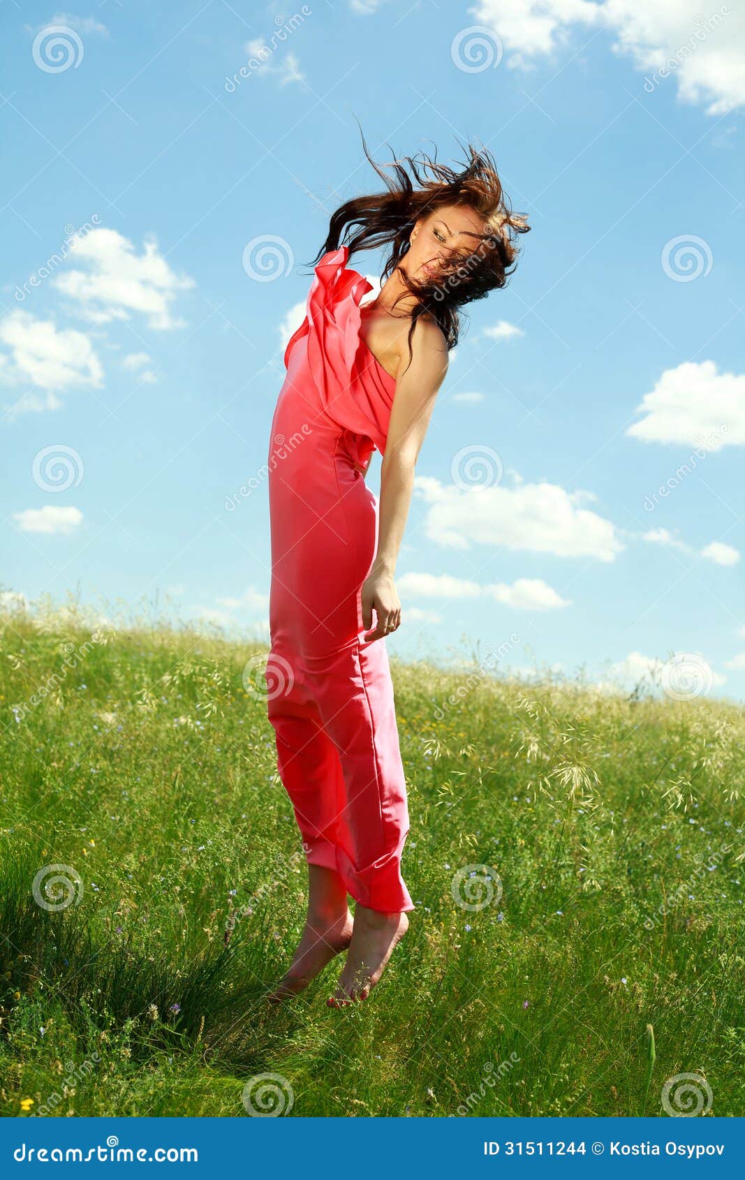 Jumping and Flying Graceful Girl on the Background of Blue Sky Stock ...
