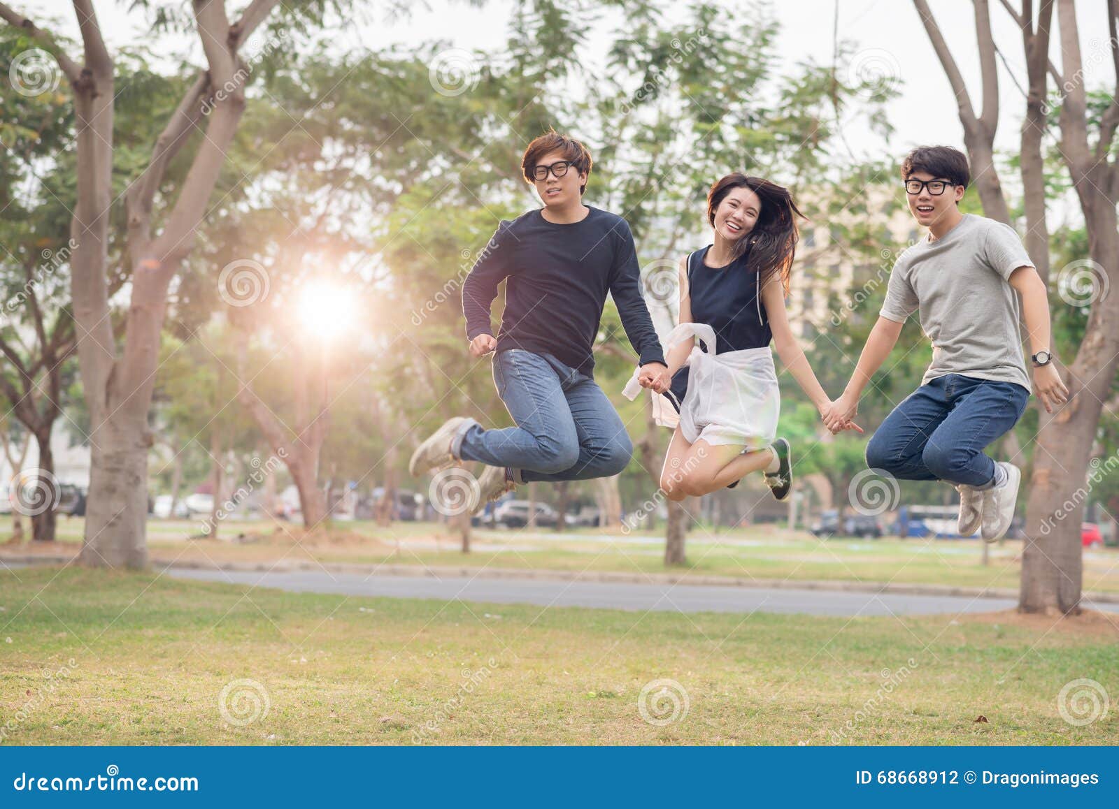 Jumping friends stock photo. Image of positive, hands - 68668912