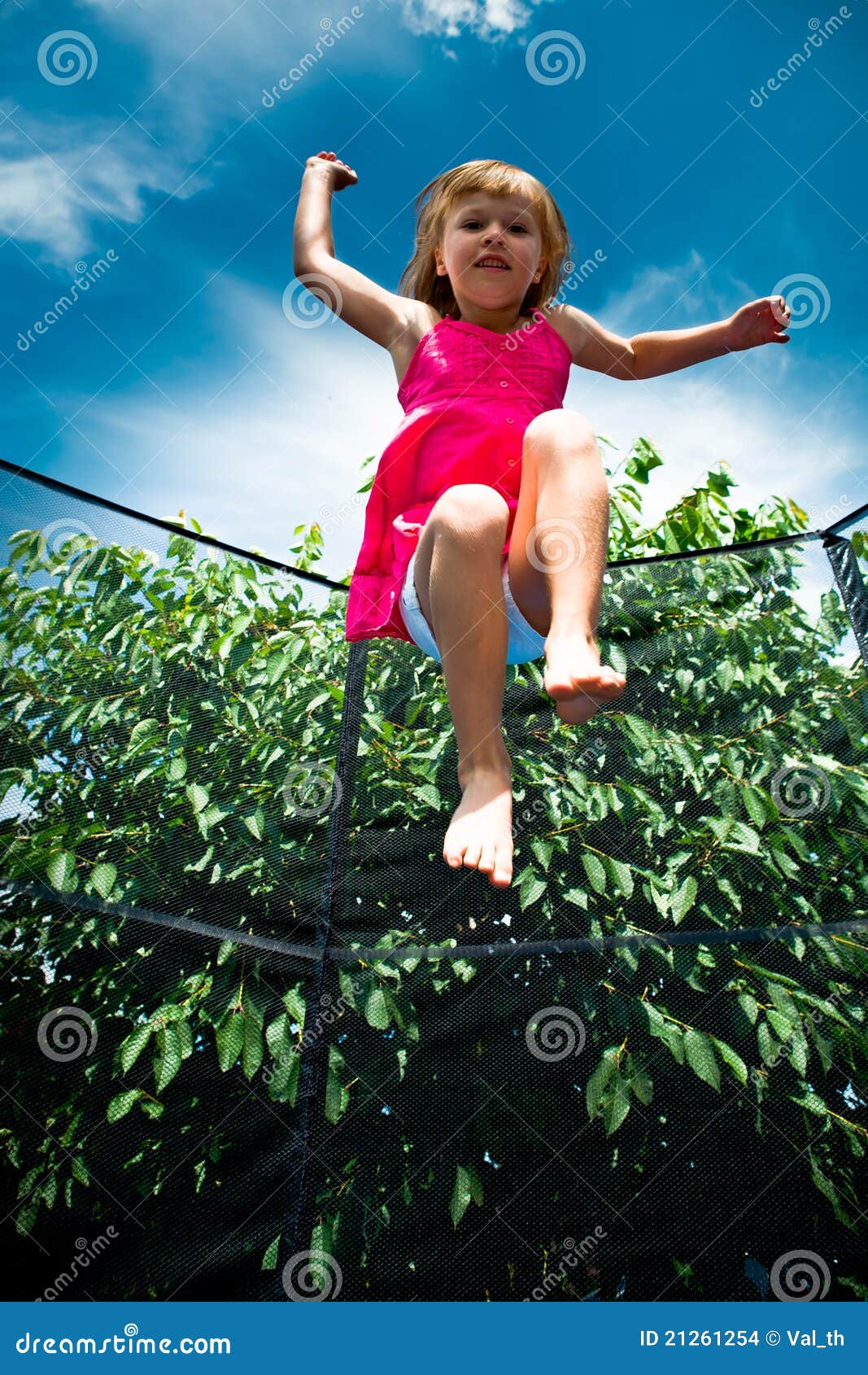 Jumping in the garden stock photo. Image of child, female - 21261254