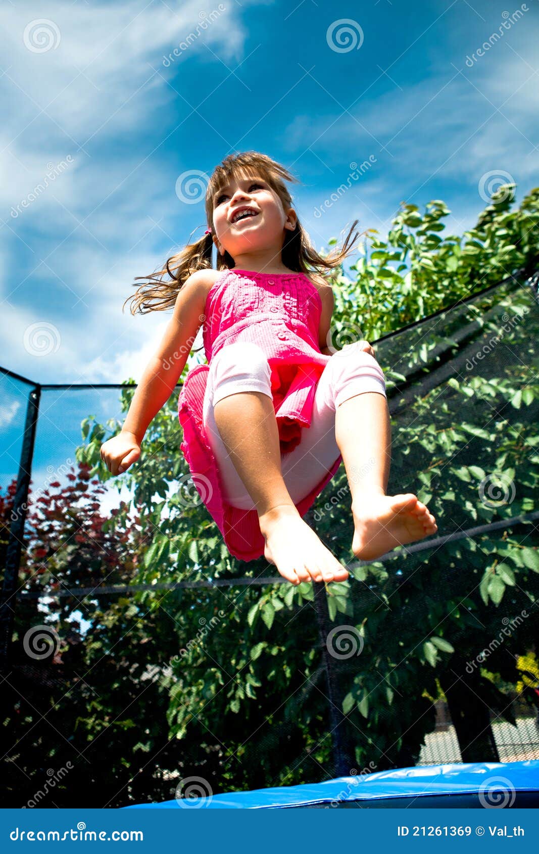 Jumping in the garden stock image. Image of outdoors - 21261369
