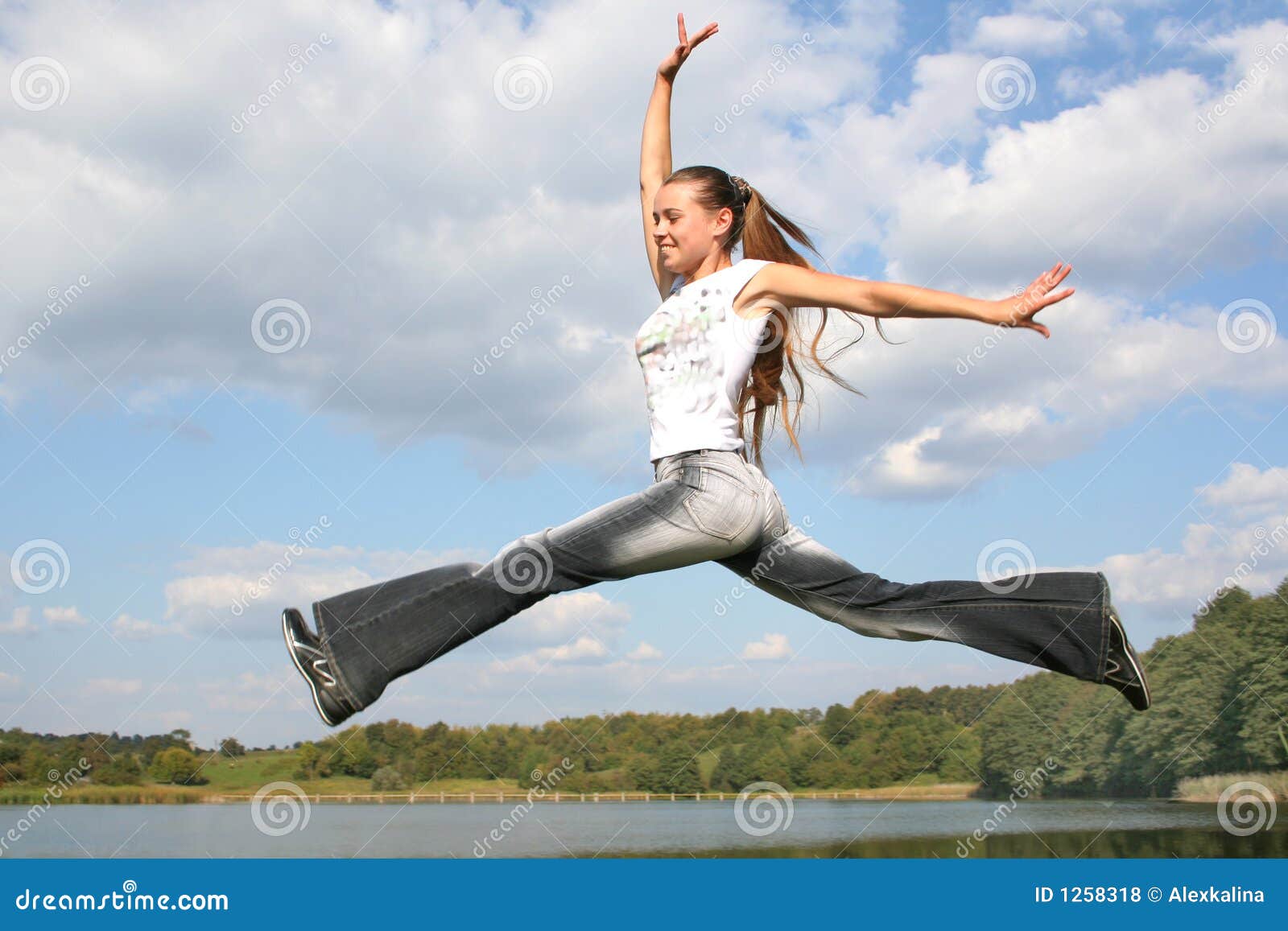 Jumping girl stock photo. Image of healthy, color, legs - 1258318