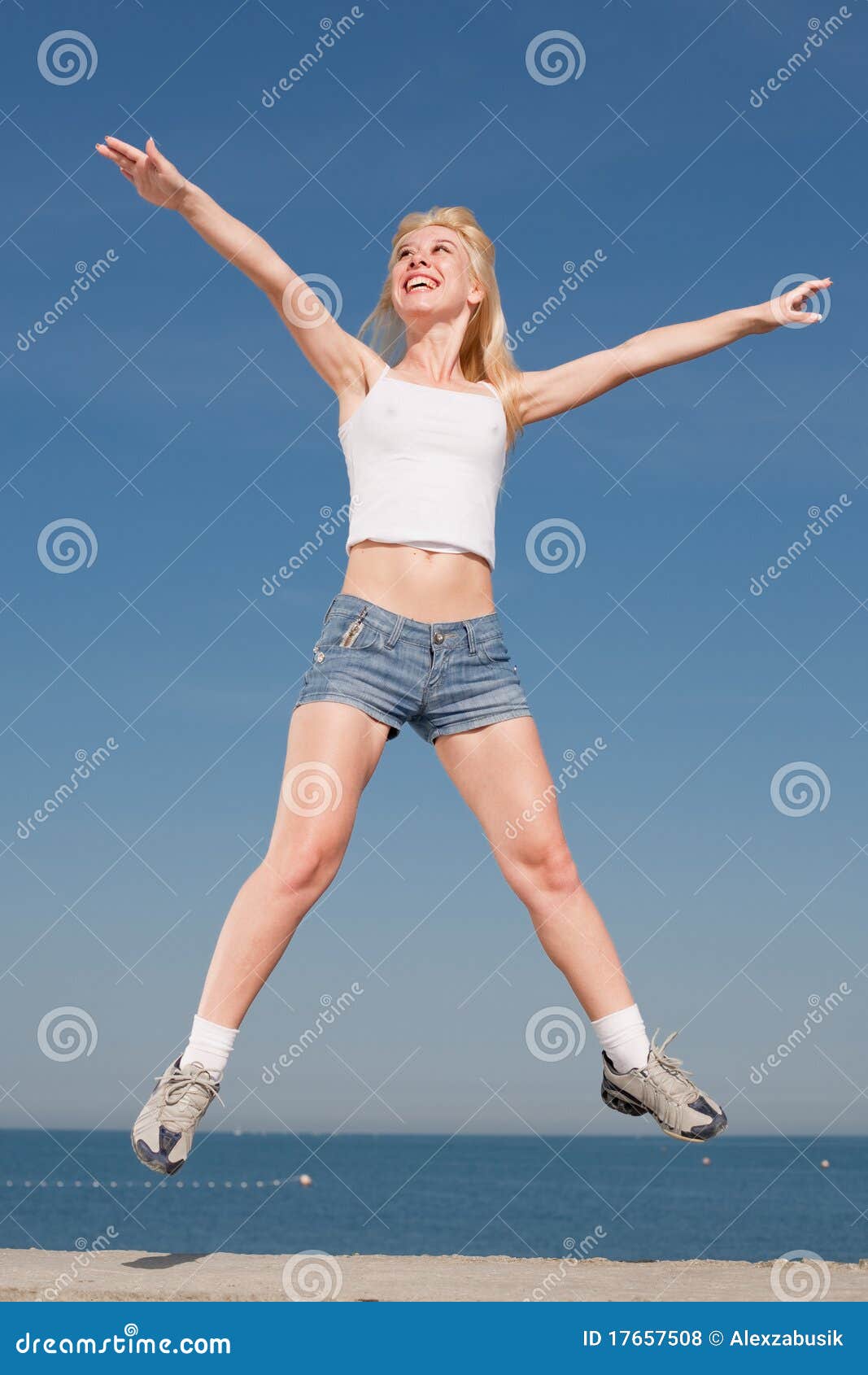 Jumping girl stock photo. Image of long, smiling, horizon - 17657508